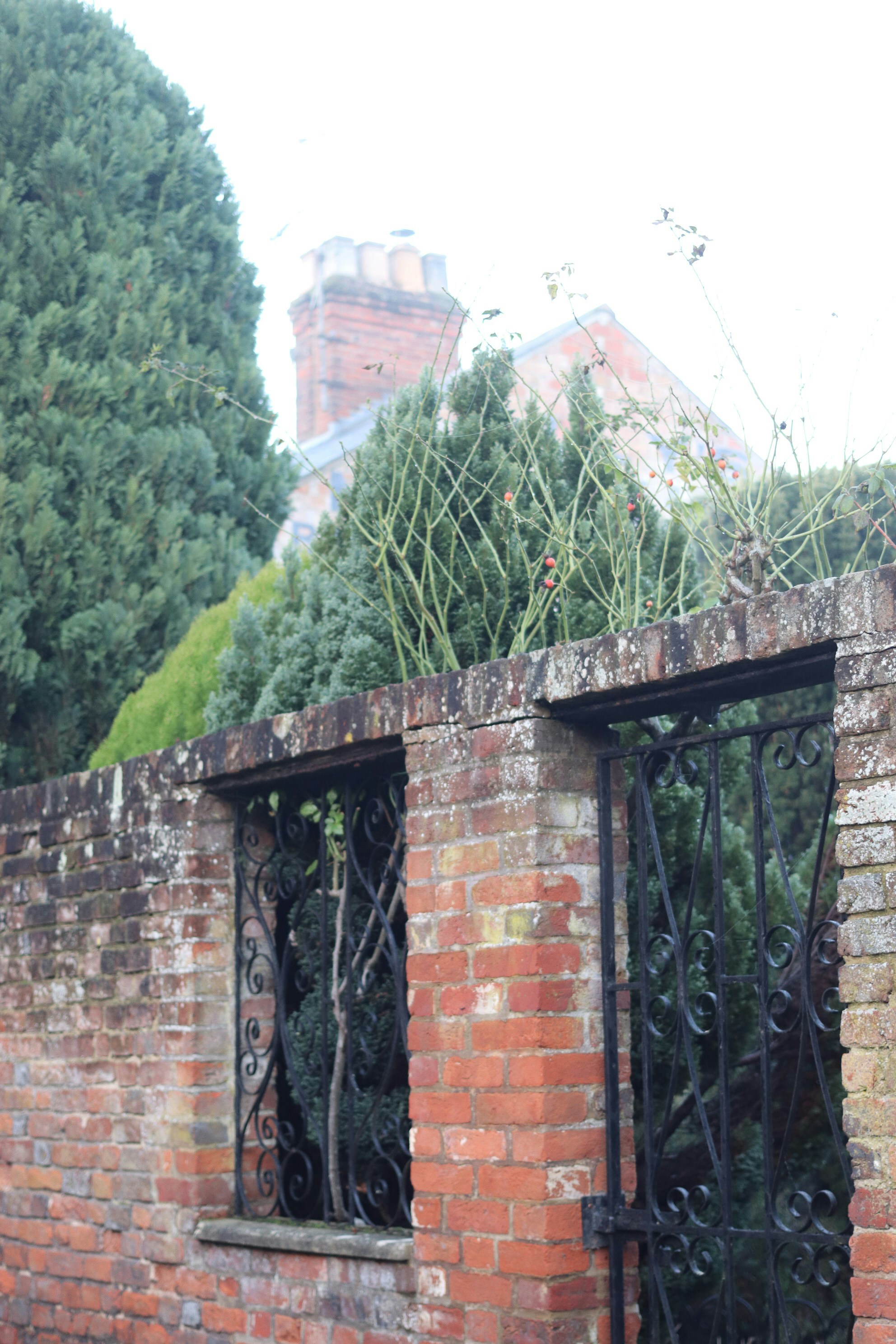 Cottage Gate and Brick Wall with Iron Bars