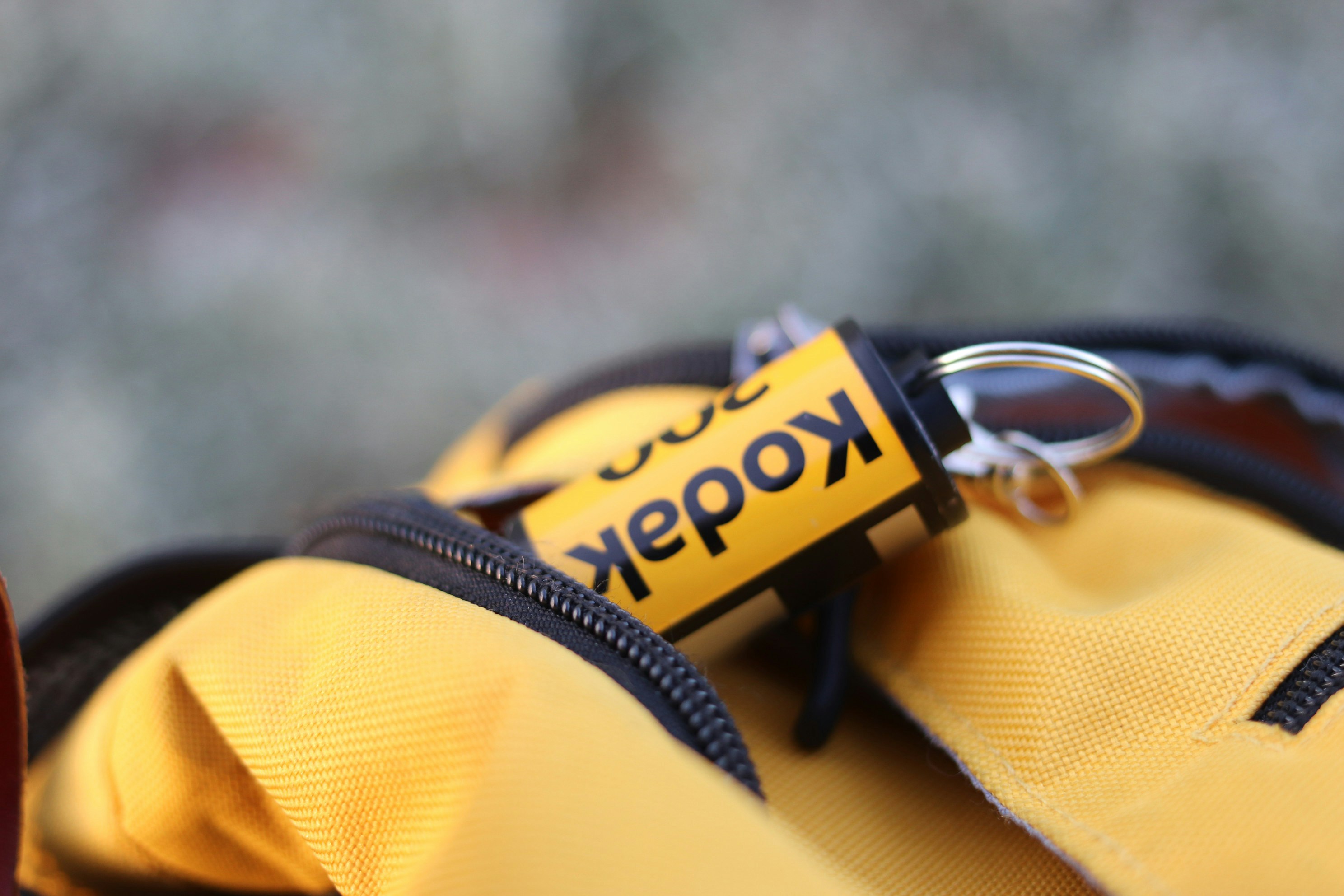 Kodar Keychain on a Bright Yellow Backpack