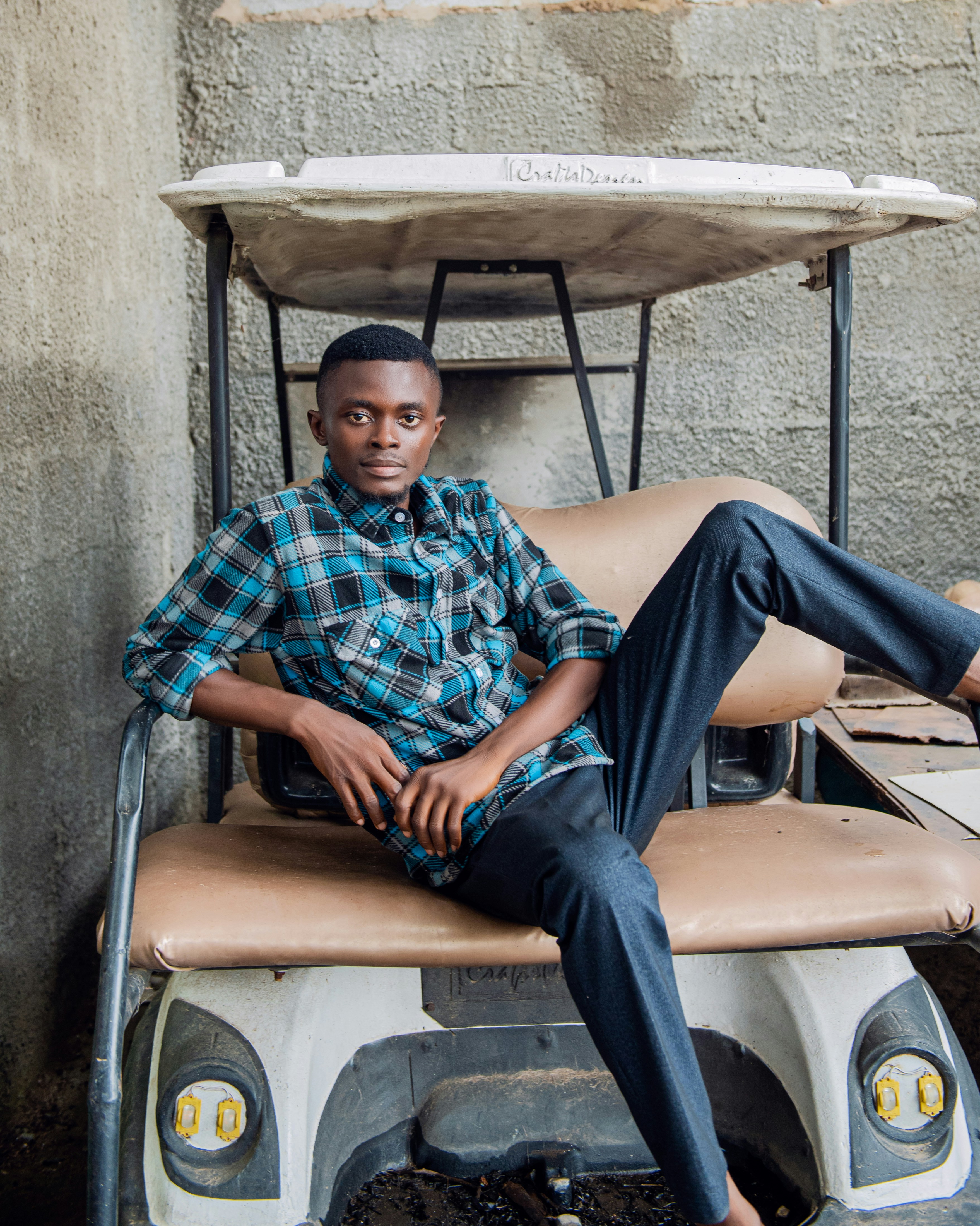 Confident Ride: A Portrait in a Golf Cart Studio.