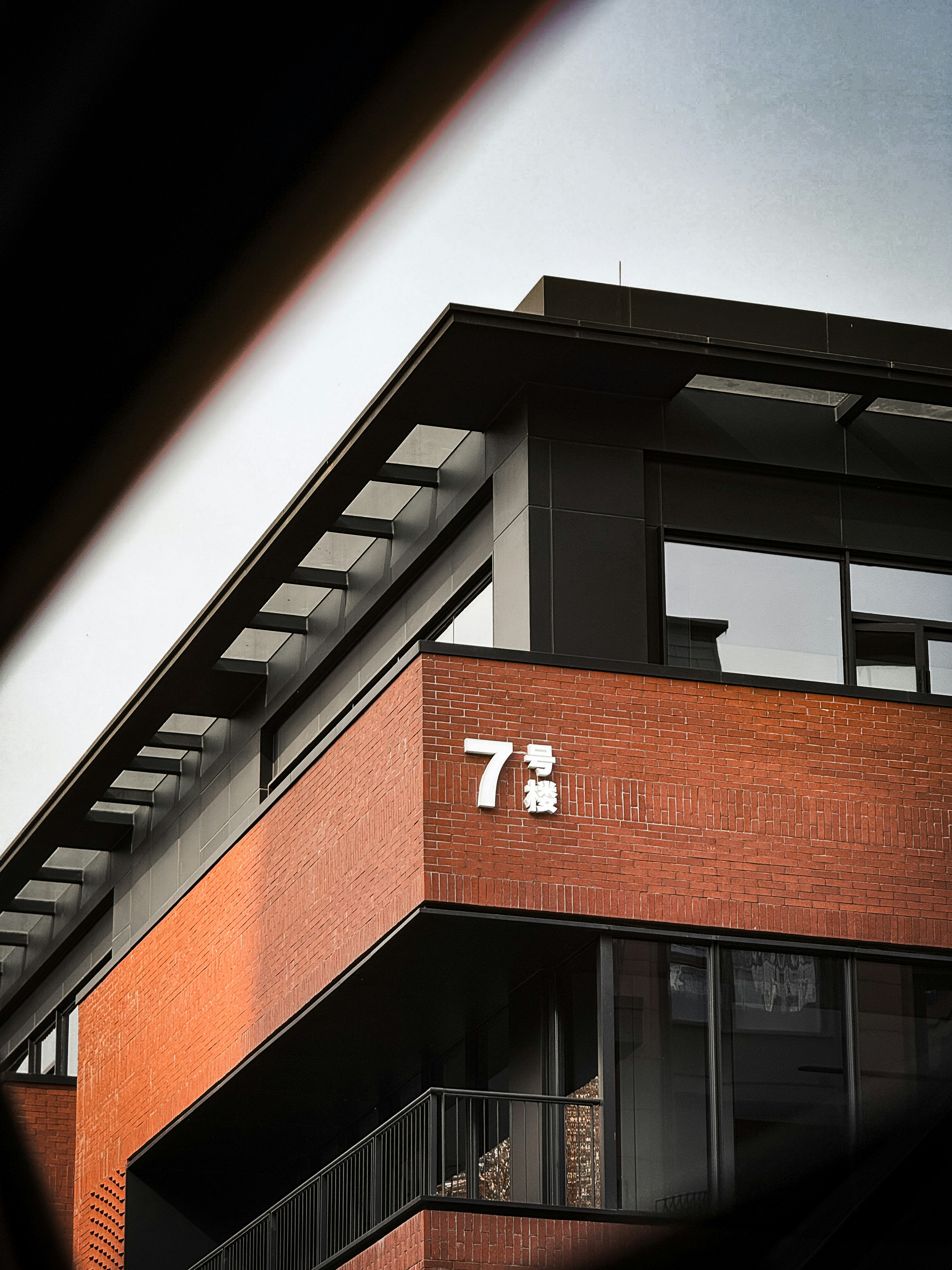 Brick Corner Anthem: Urban Architecture Framed by Shadow