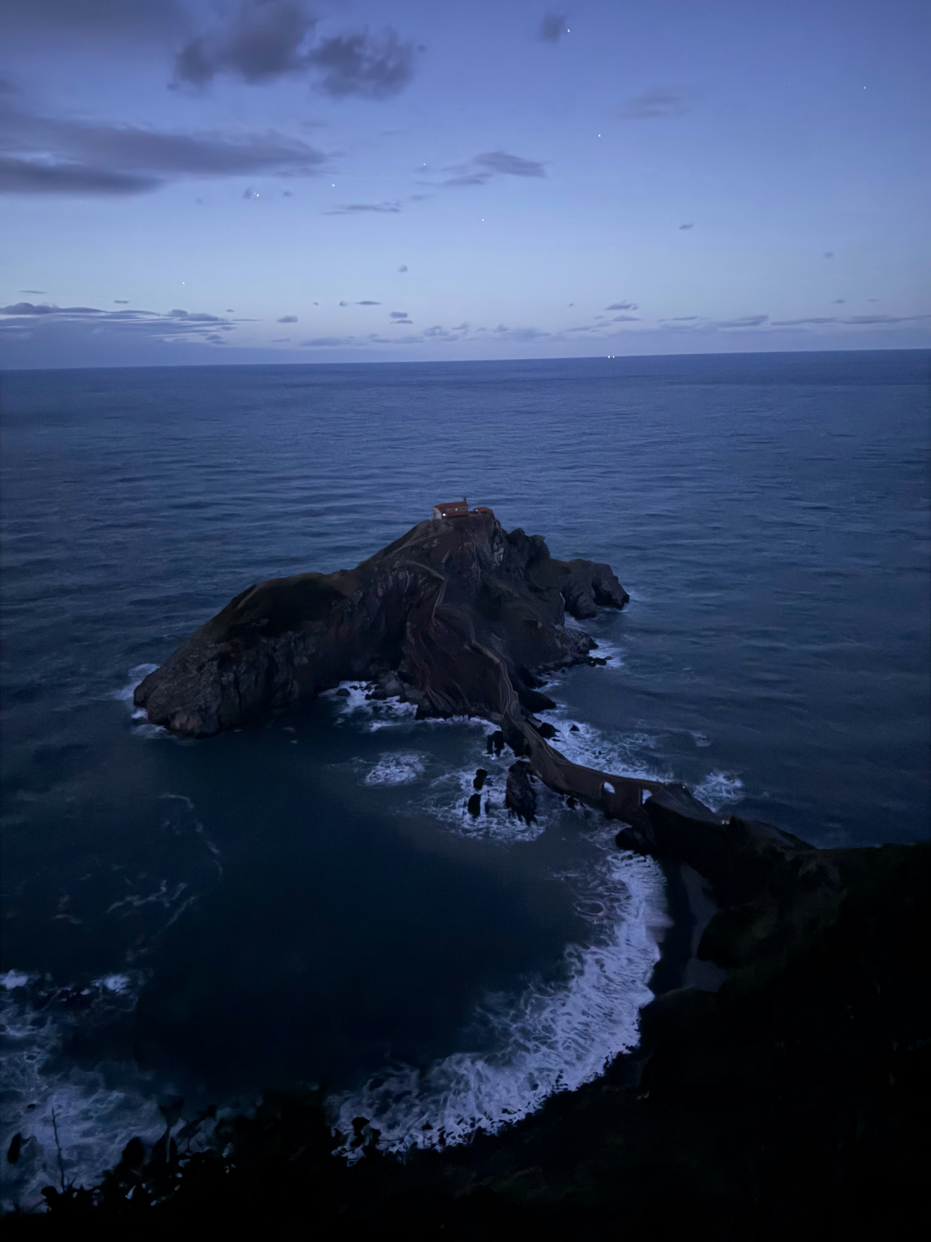 Moonlit Rock Trail Dana: A Serene Ocean Outcrop at Dusk