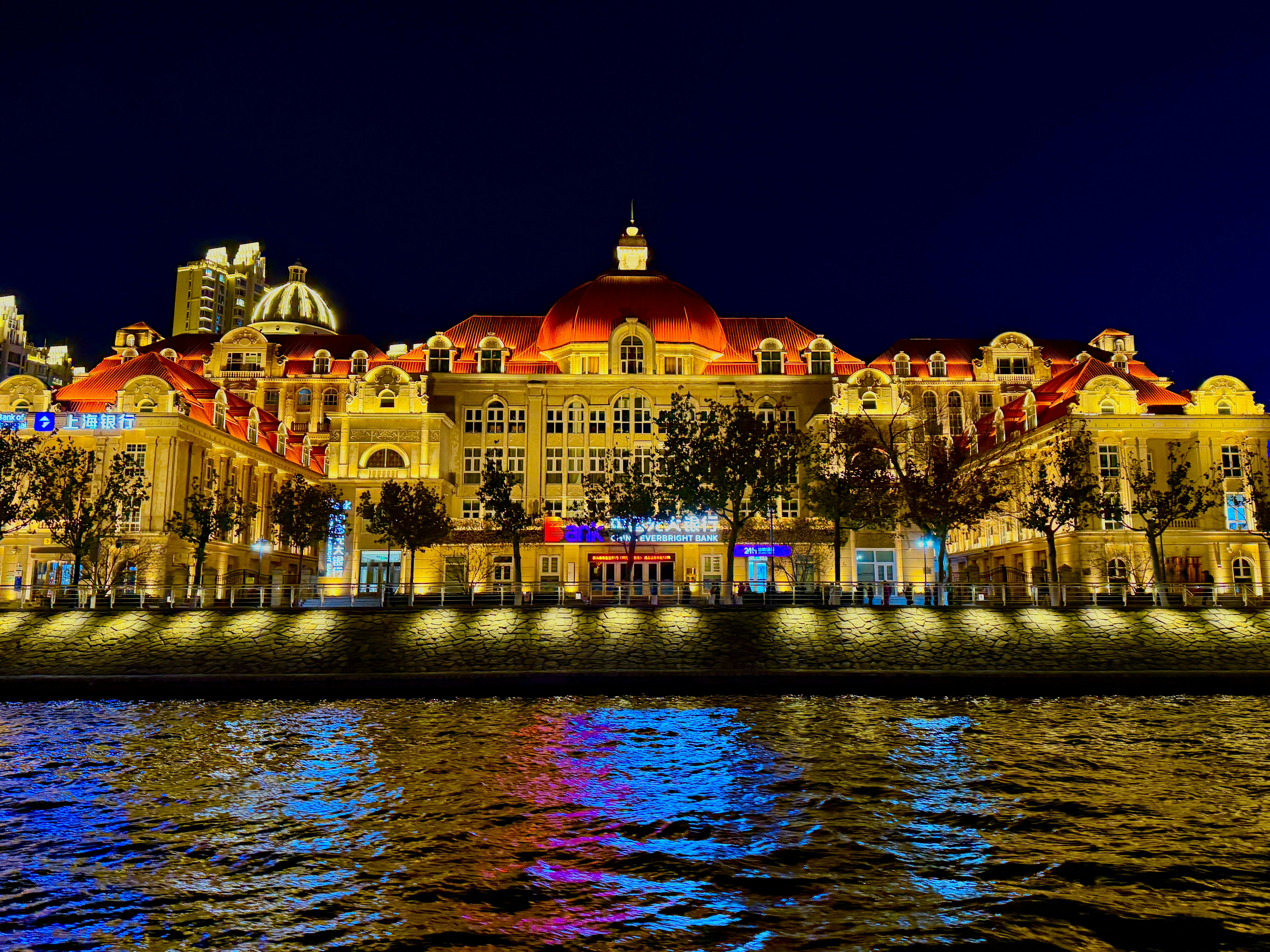 Neon-Crowned Waterside Grandeur