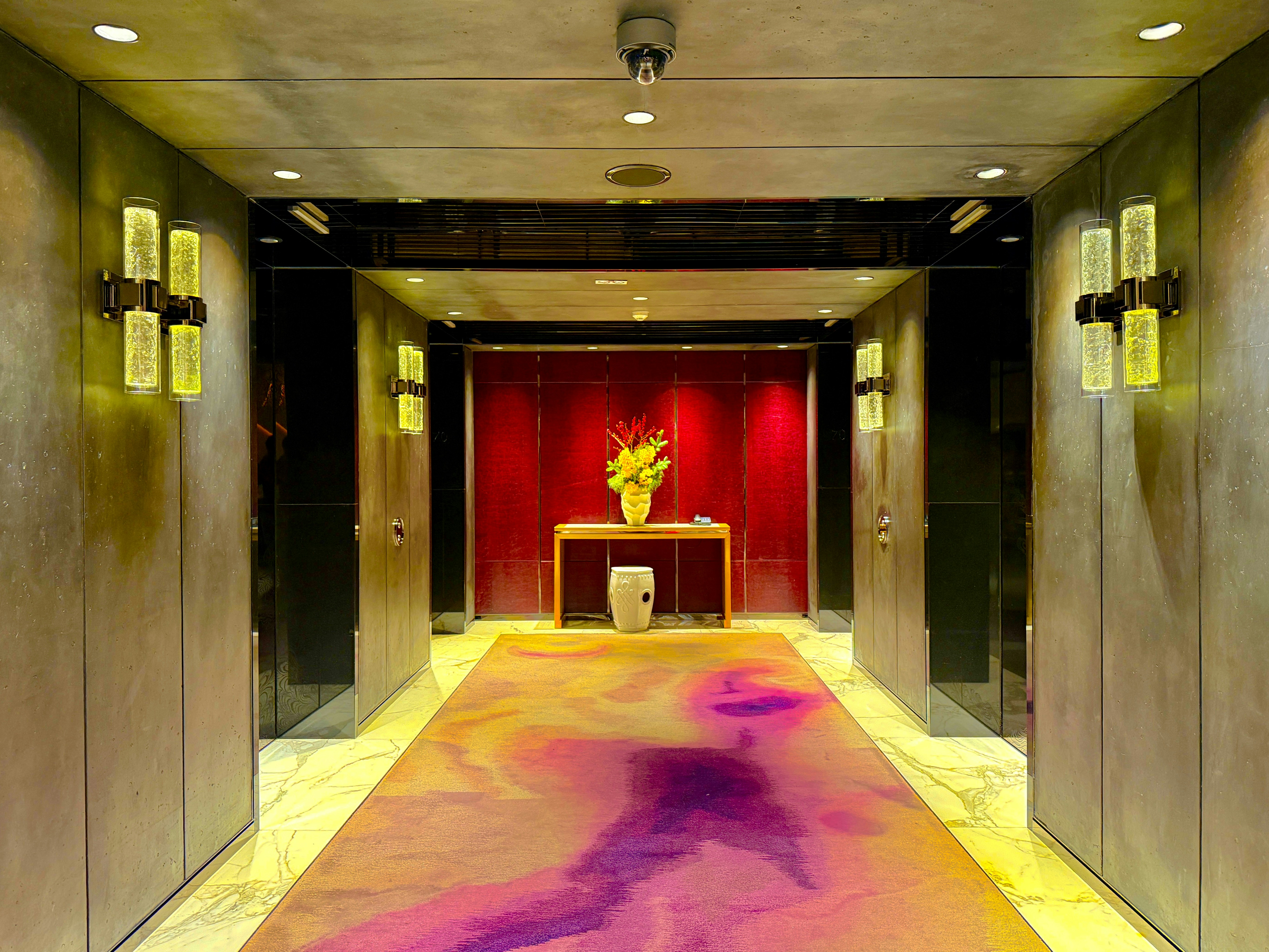 Red Carpet Corridor: A Luminous Hallway to the Centerpiece