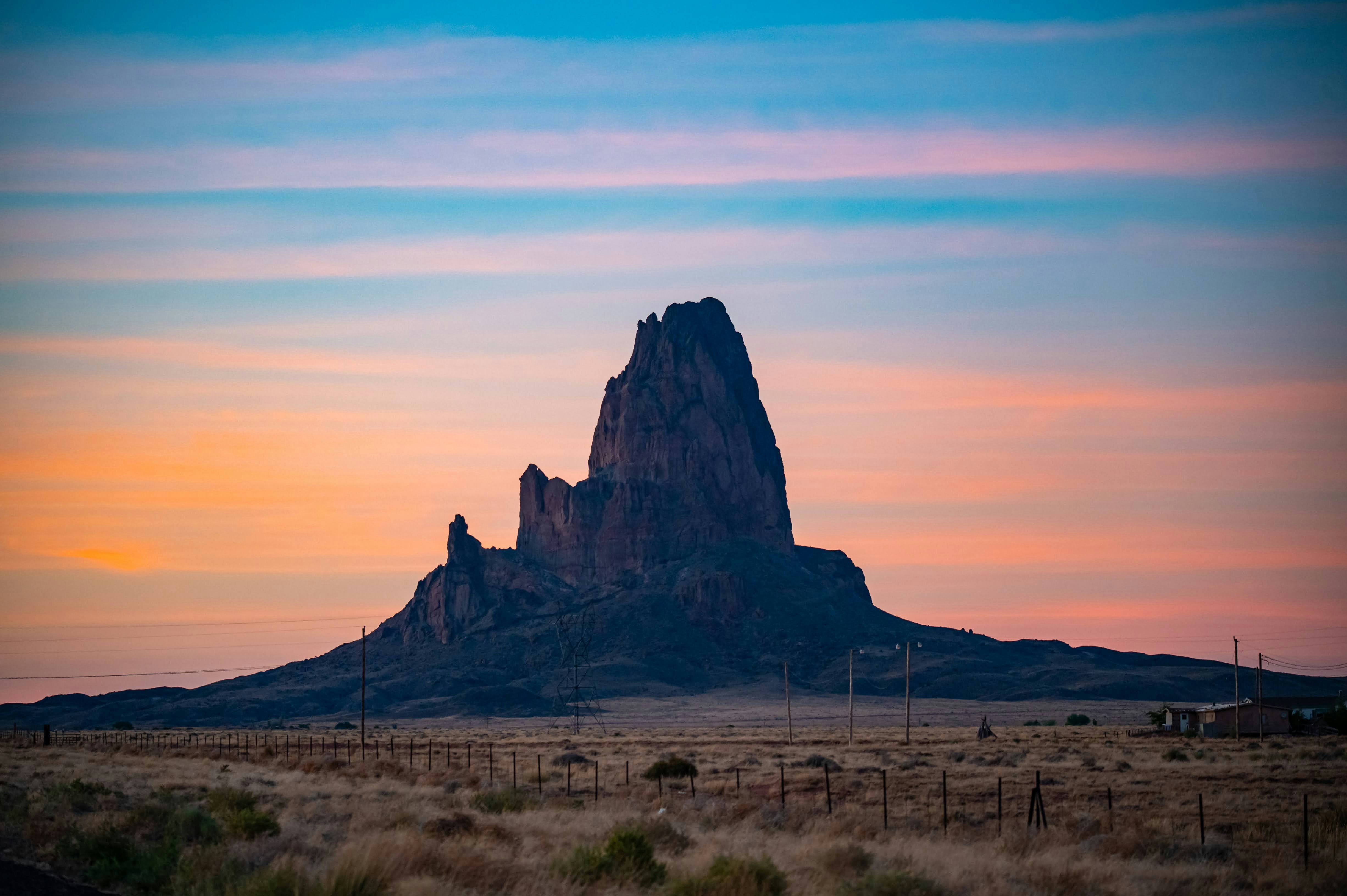 Distant Monolith Amid Desert Skies