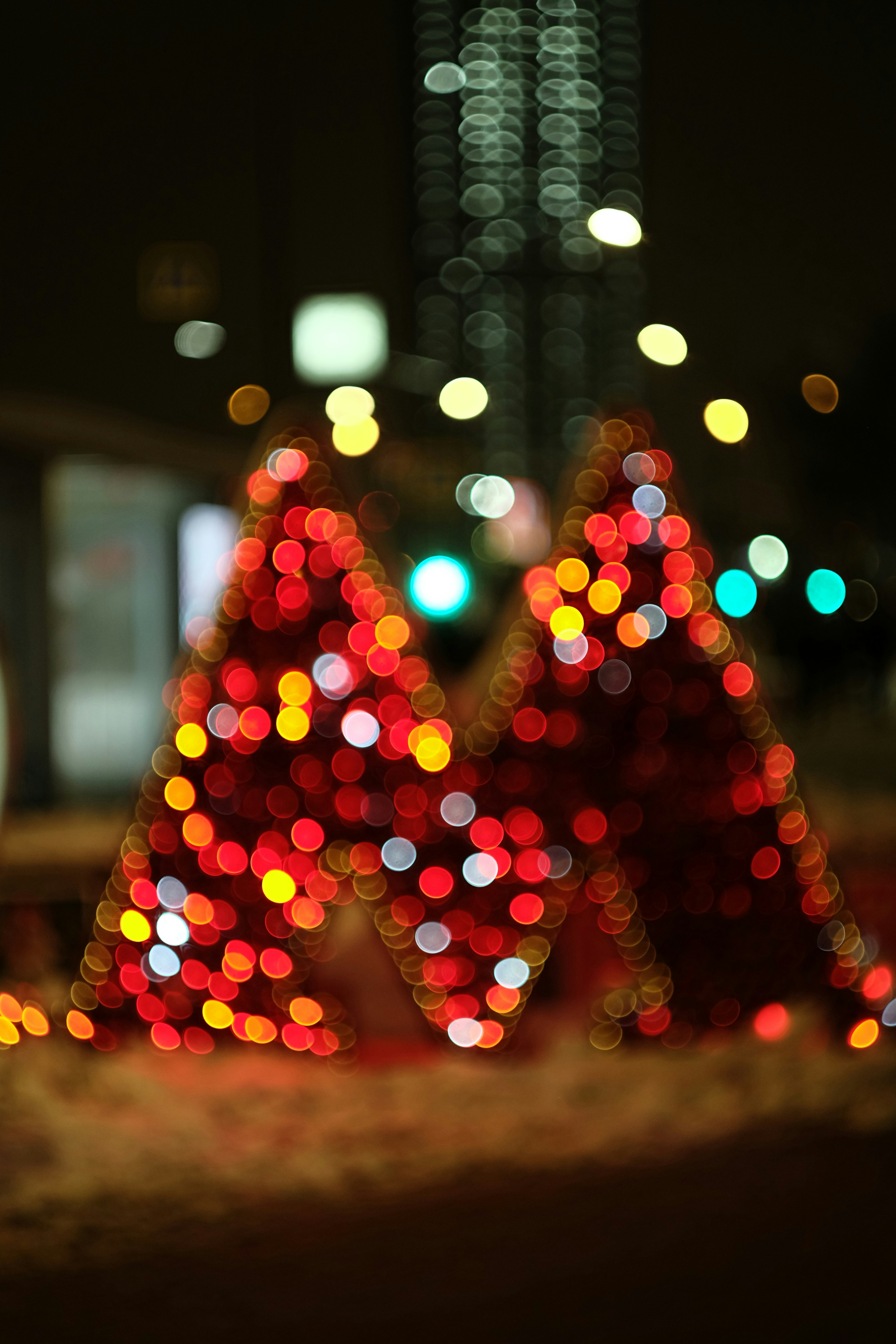 Night Bloom: Bokeh Christmas Trees Blur into Neon Orbs