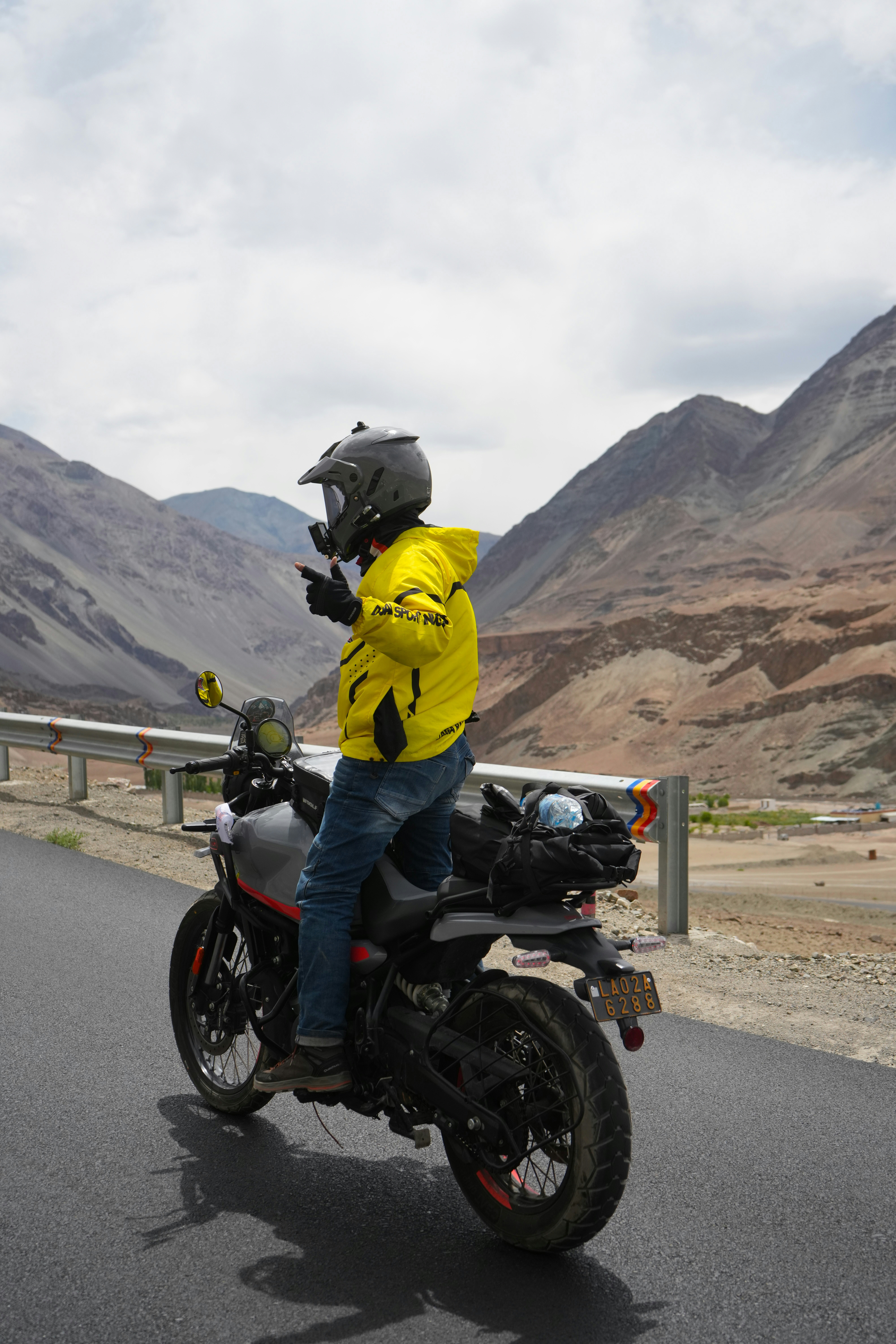 Yellow-Jacket Rider on a Mountain Pass