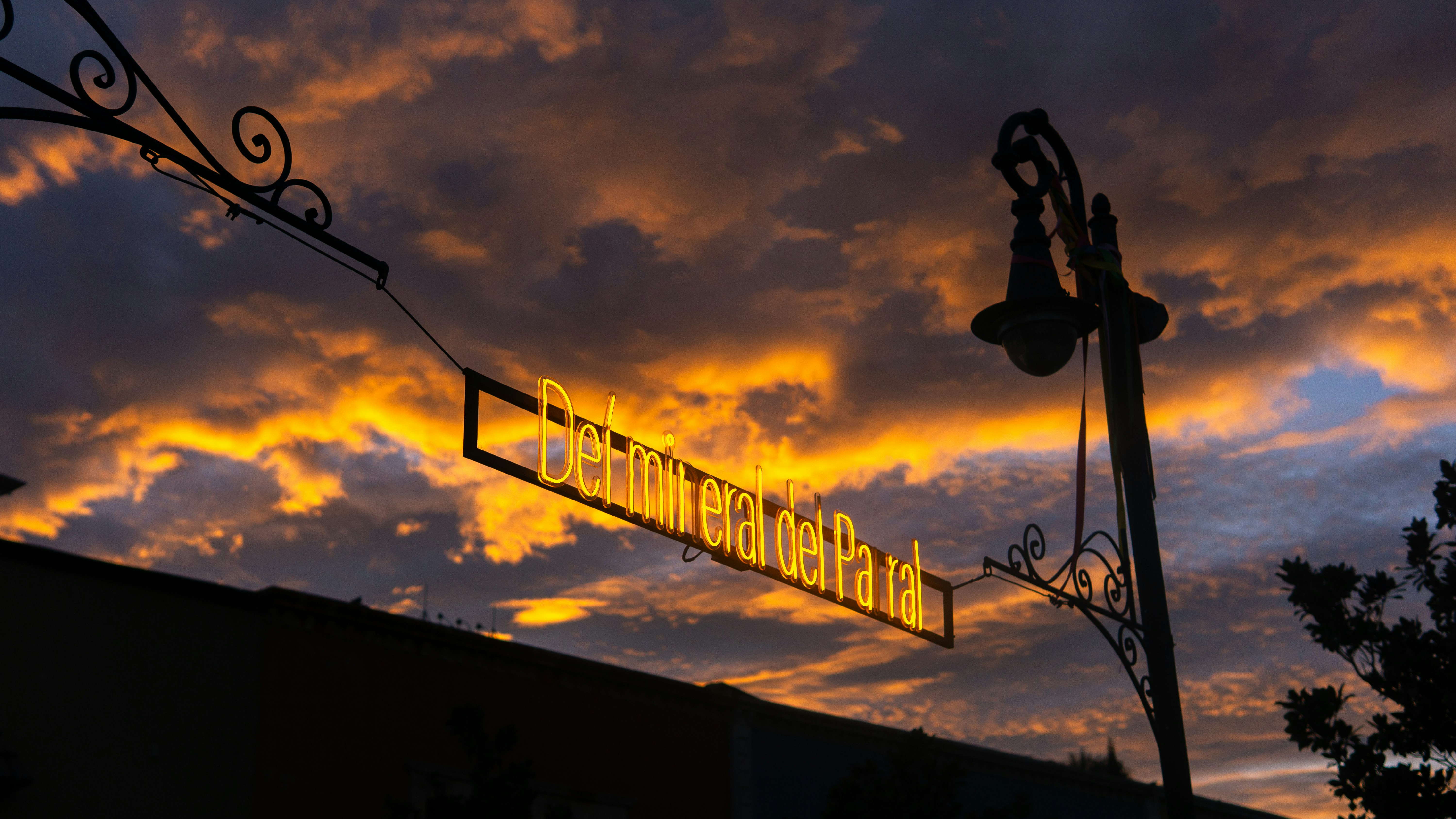 Golden Sign Against a Fiery Dusk