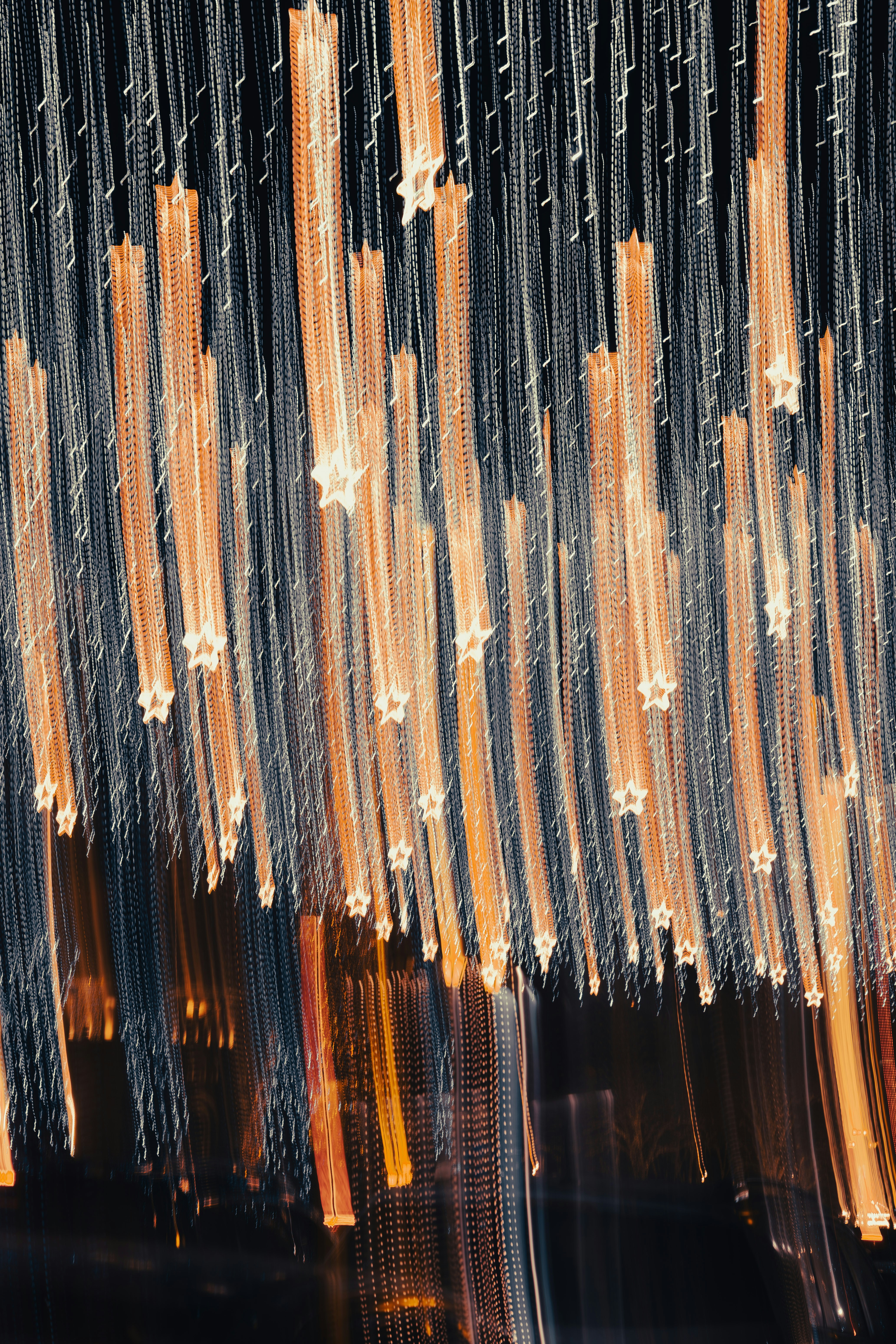String of Nightfall Stars Over a Neon Street