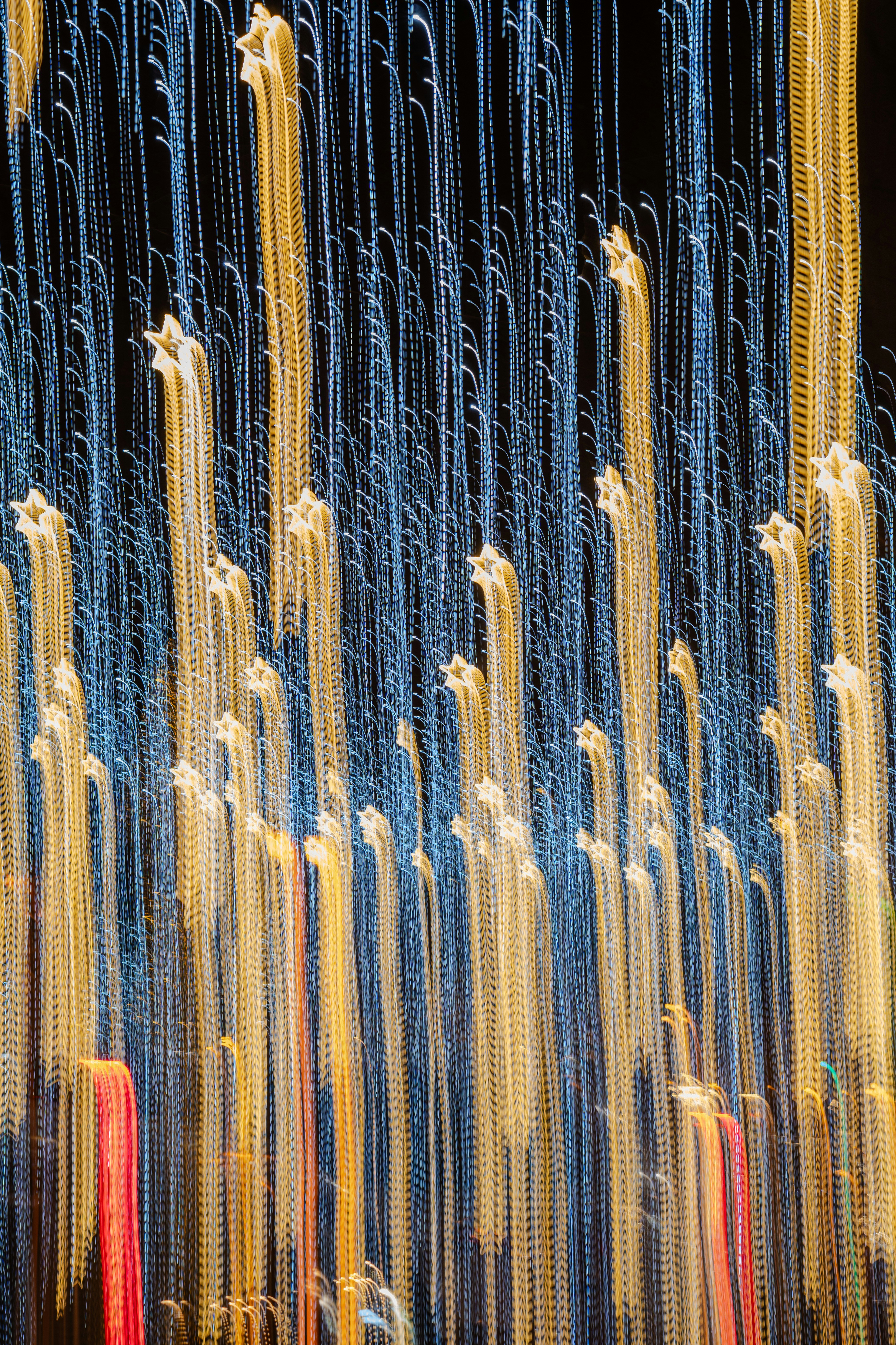 Neon Rain: Vertical Streaks of City Light