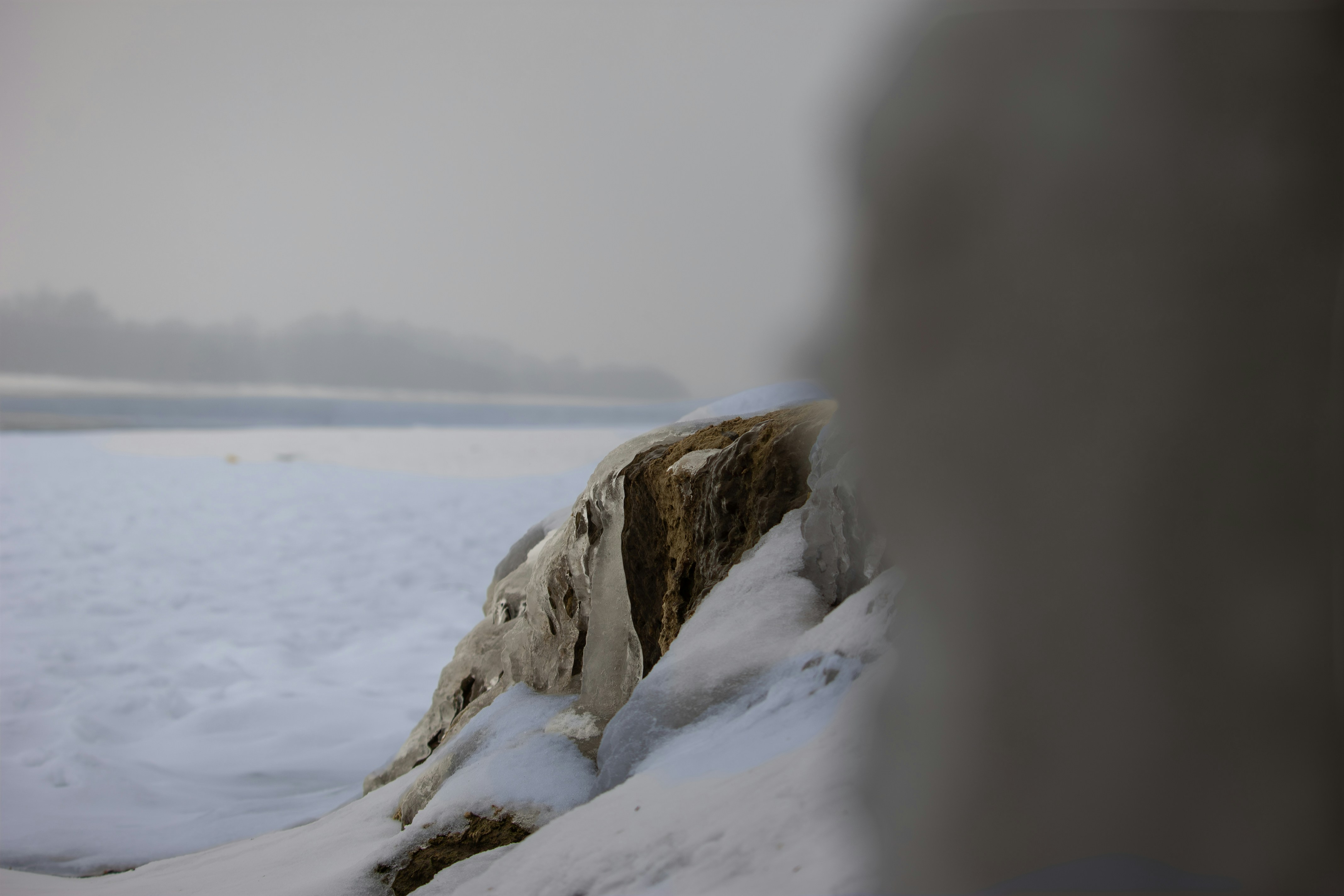 Snowbound Ridge Hidden by a Concrete Boundary