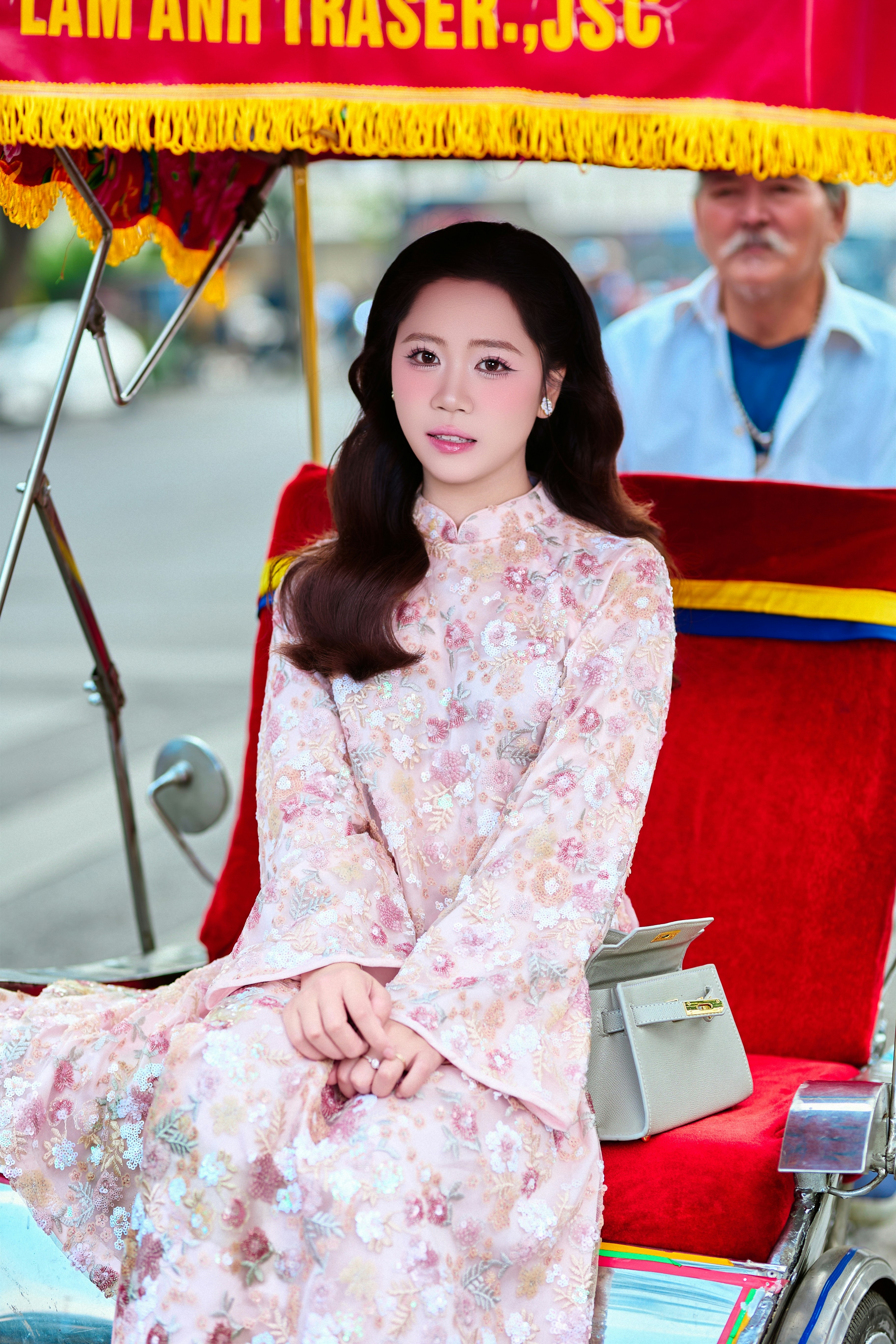 Poised in a City Taxi: Grace in a Floral Veil