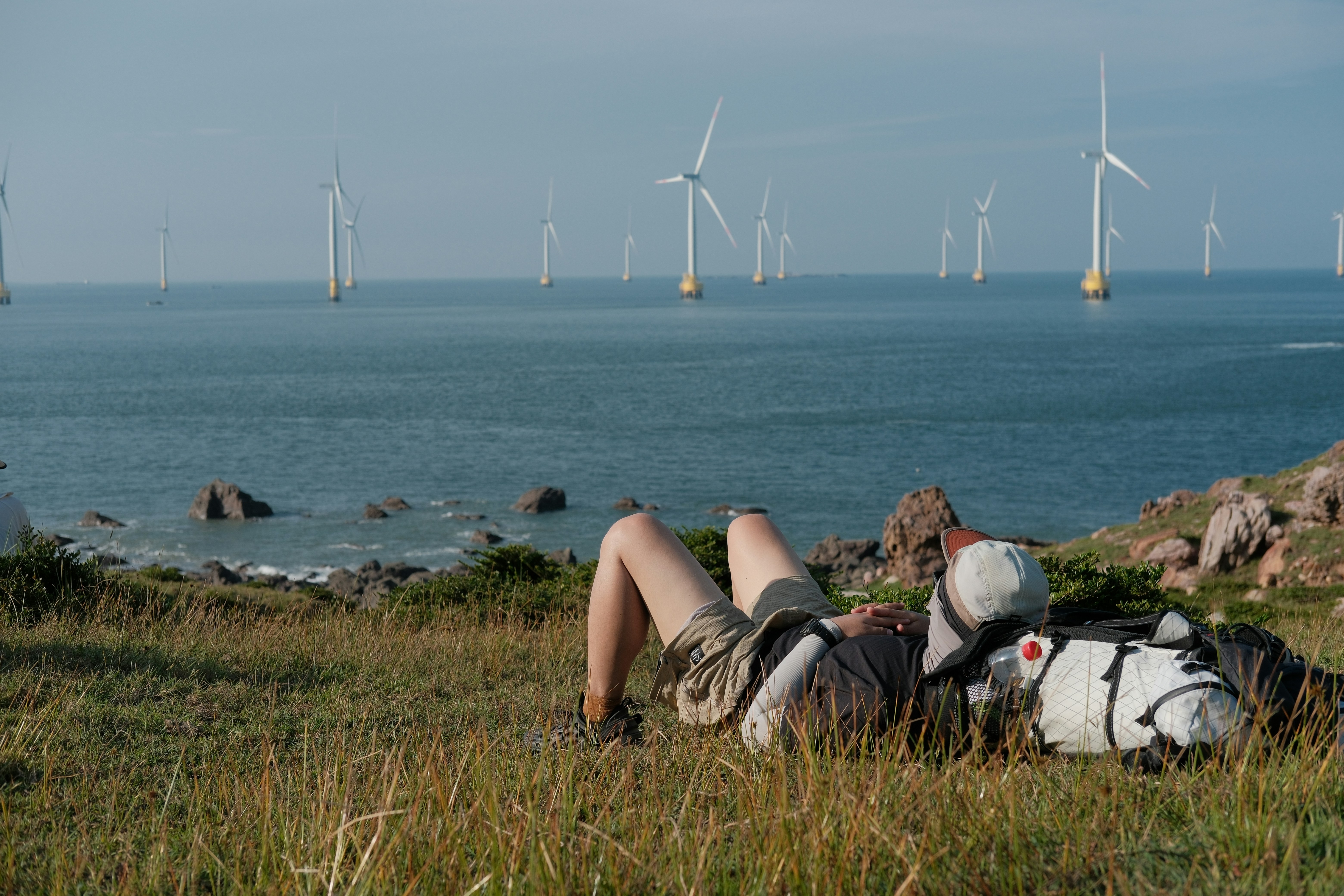 Sunlit Rest by the Wind Farm