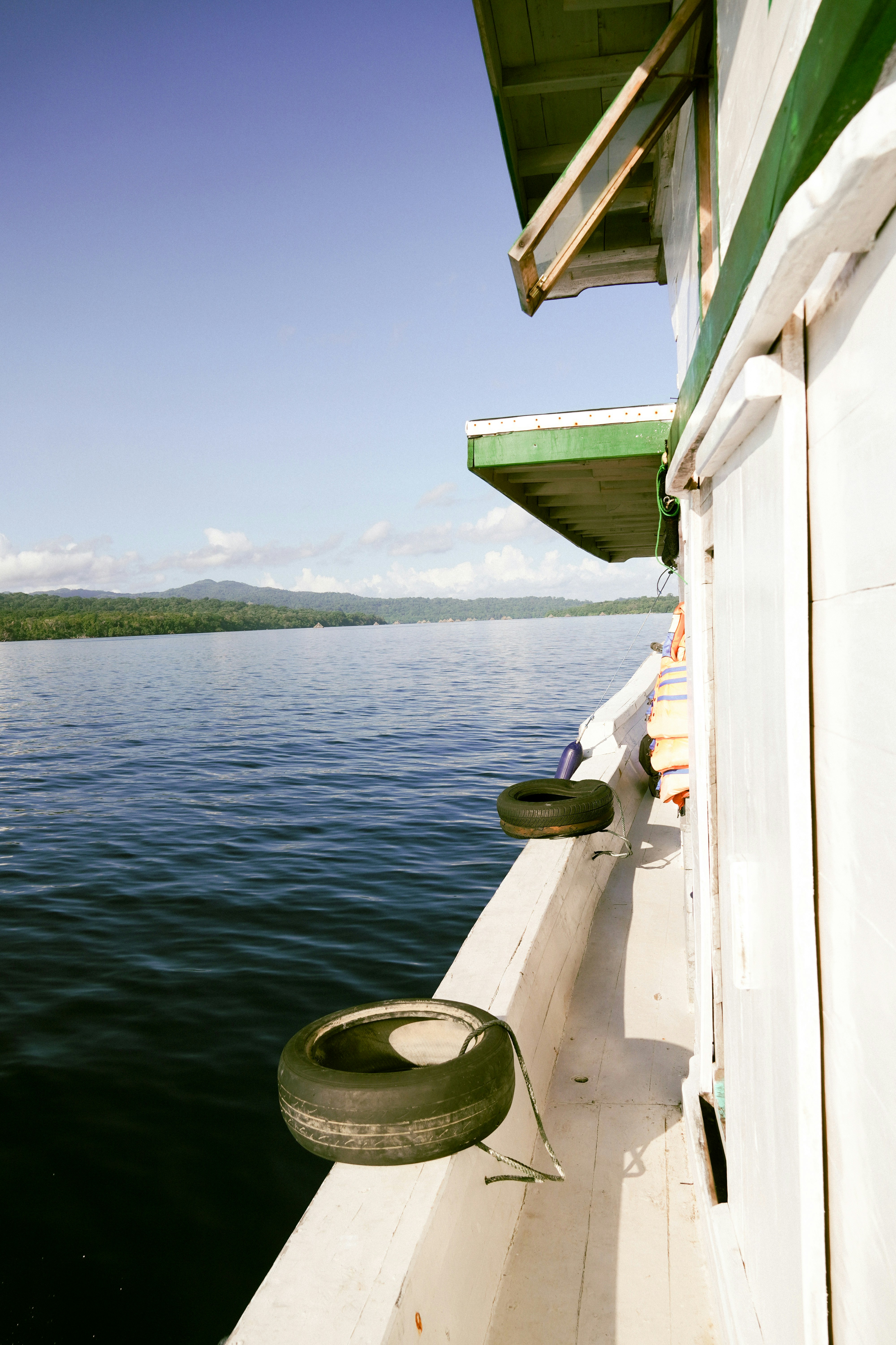 Onboard Horizon: A Quiet River Ride Along a White-Washed Deck