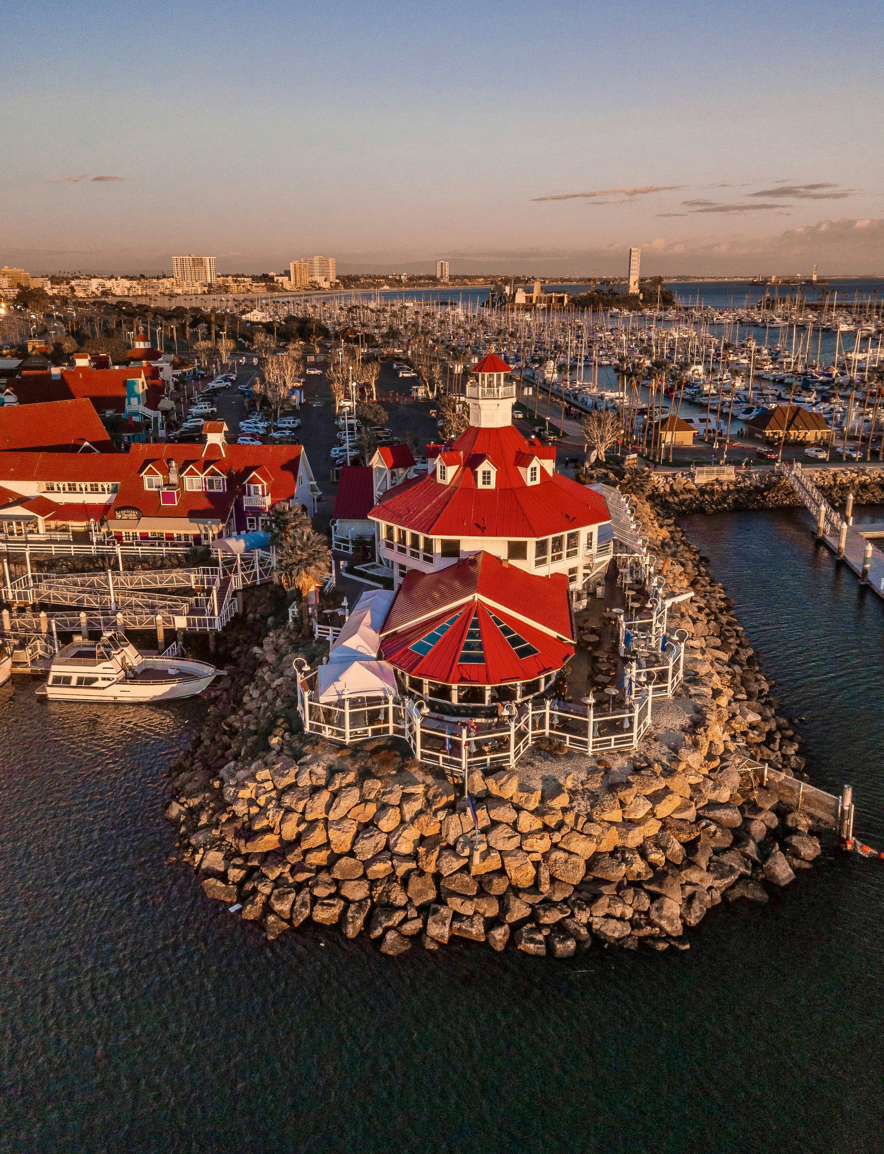 Red‑Roofed Lighthouse Island: A Colorful Marina Panorama