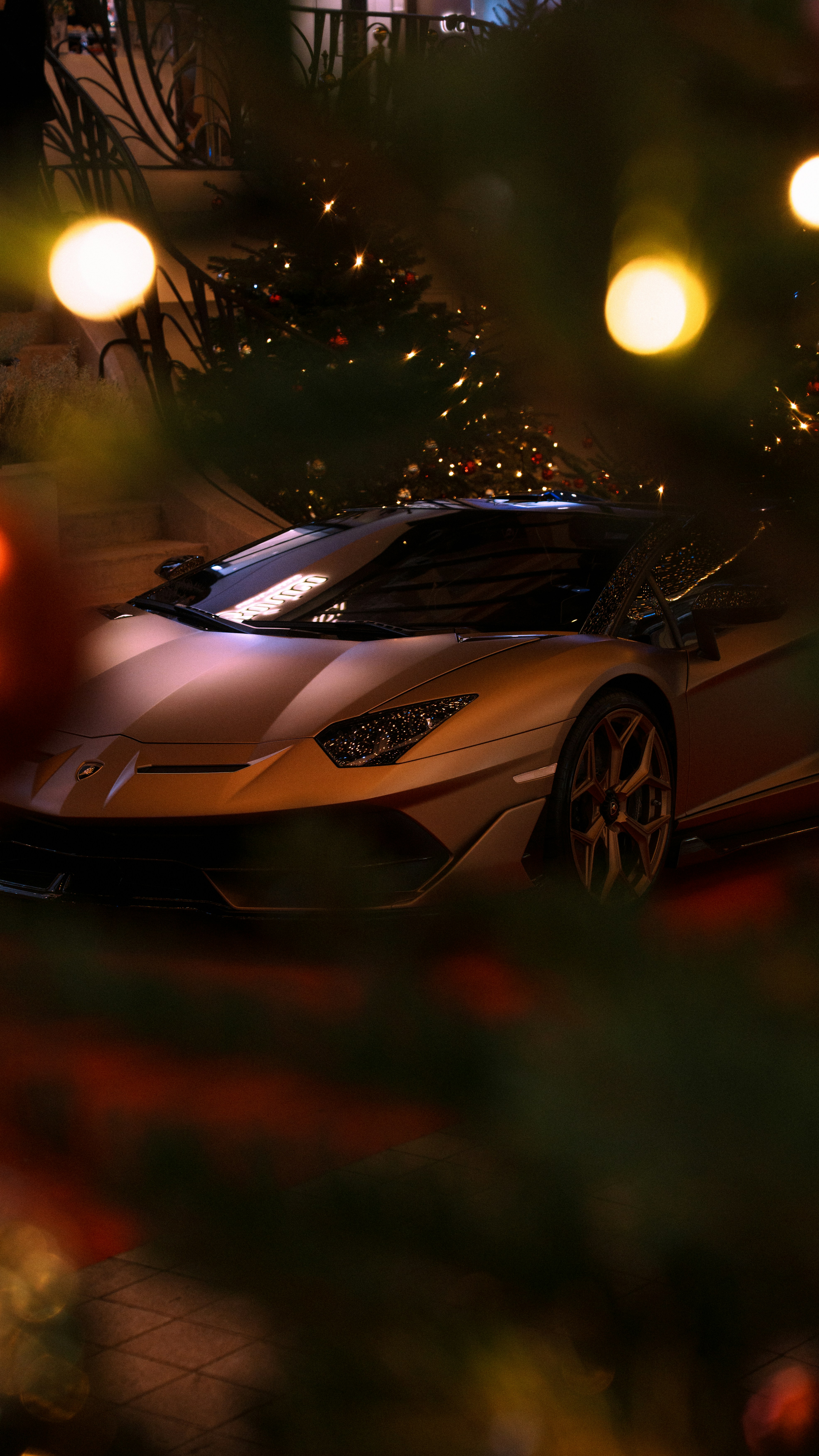 Glittering Luxury Under holiday glow: Silver Supercar Amid Christmas Lights