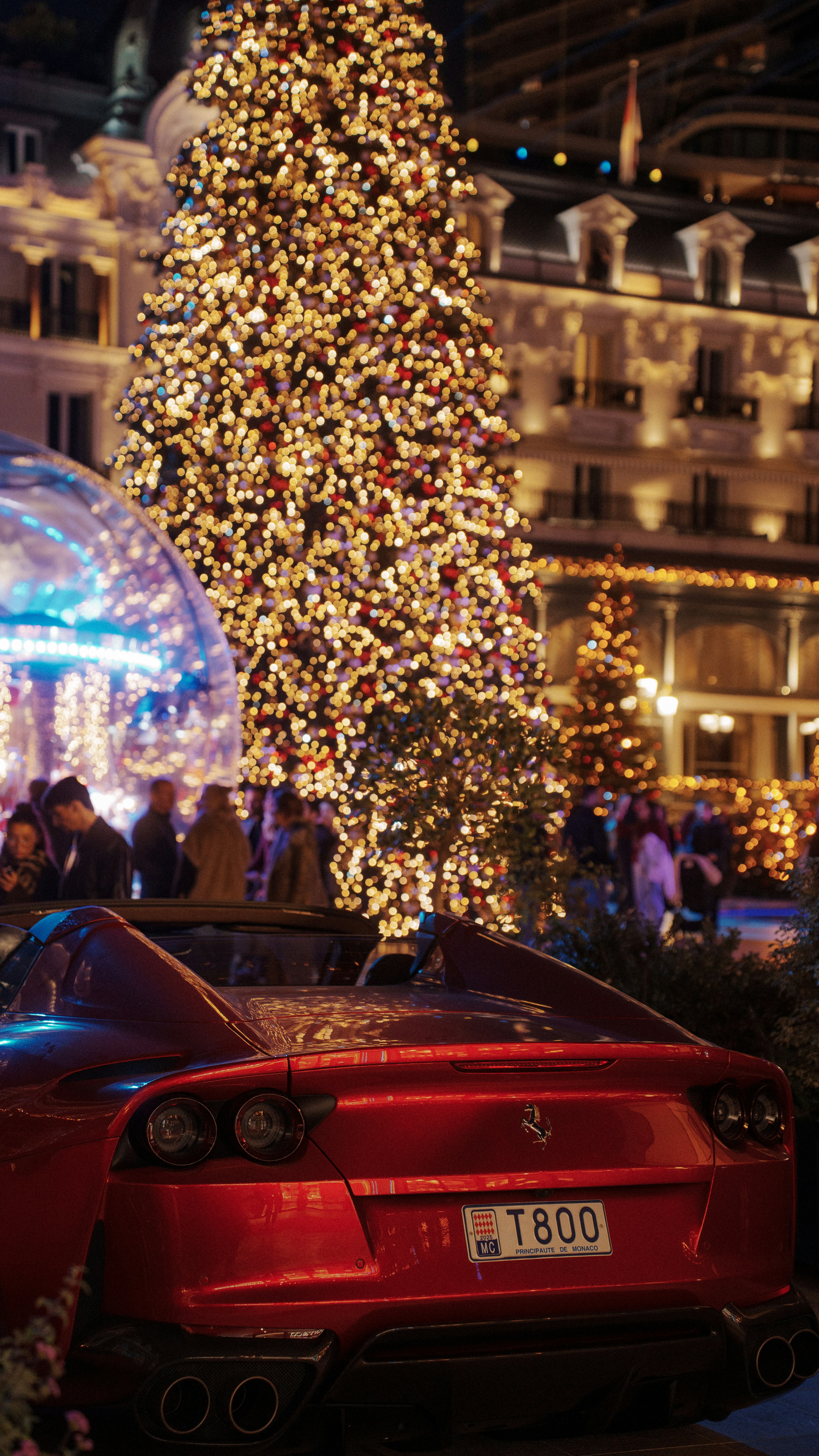 Crimson Ferrari Under the Holiday Glow