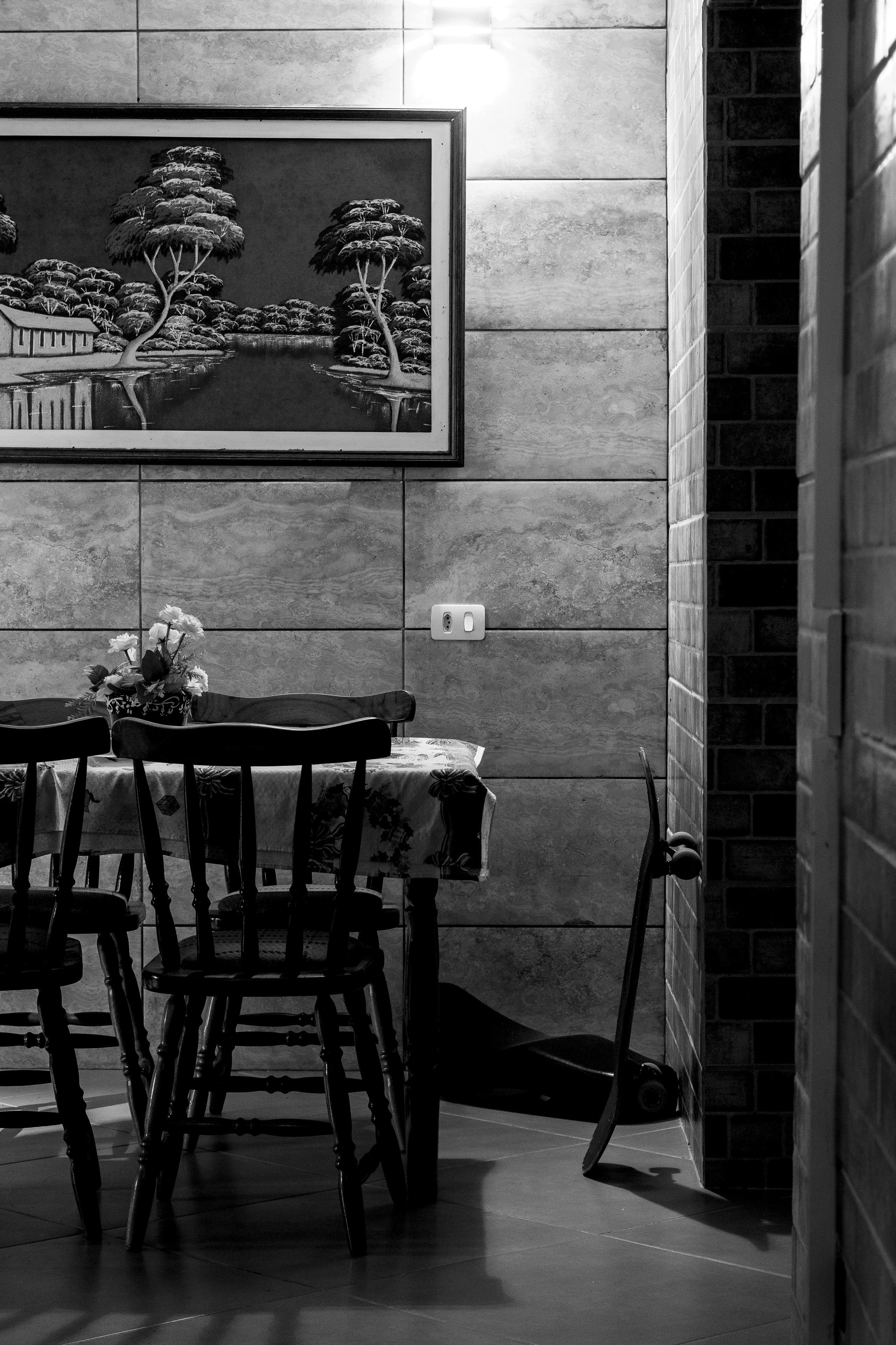 A still life of a table, chairs, and a skateboard. photo – Free Flowers ...