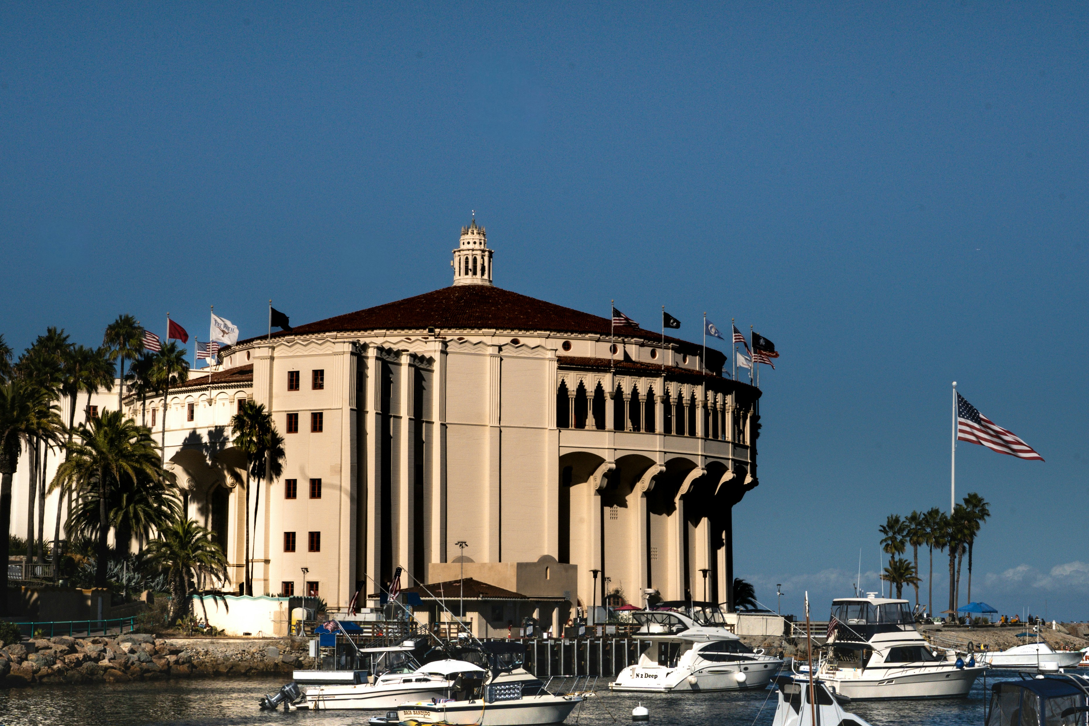 Harborfront Villa: A Mediterranean Revival Building Framed by Palm Avenues