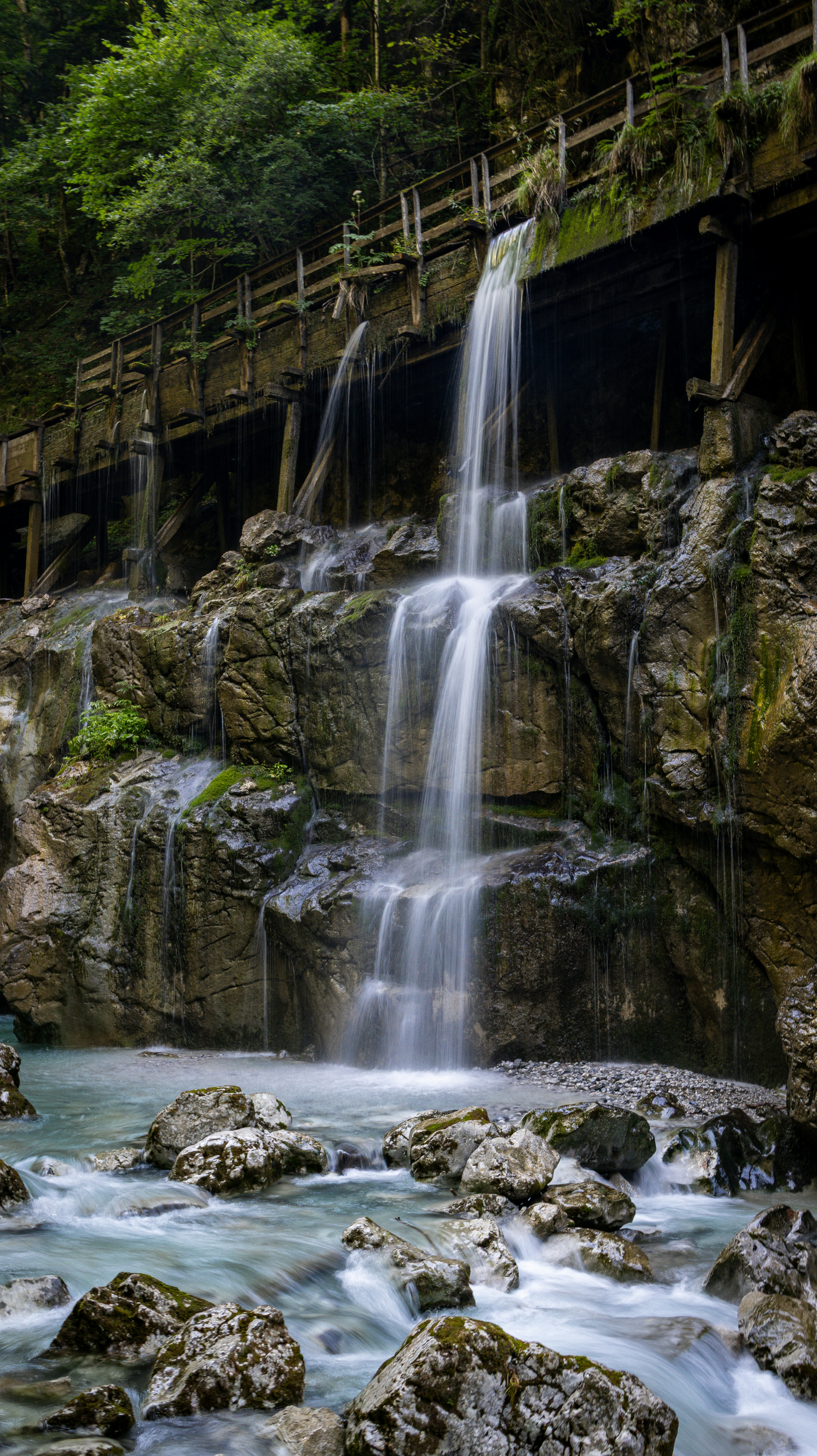 Cascade under a Weathered Bridge