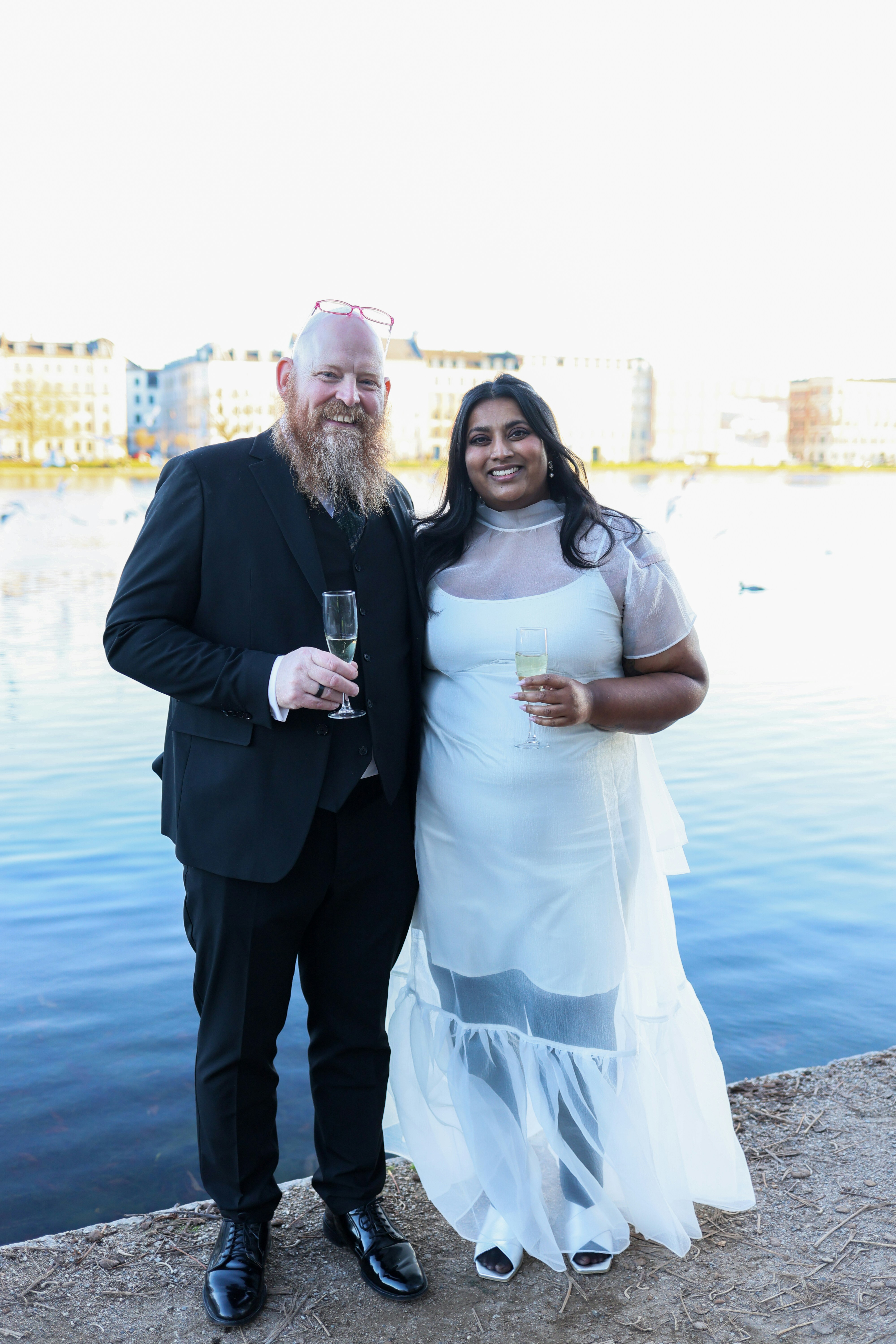 Champagne by the Water: A Dual Celebration Portrait