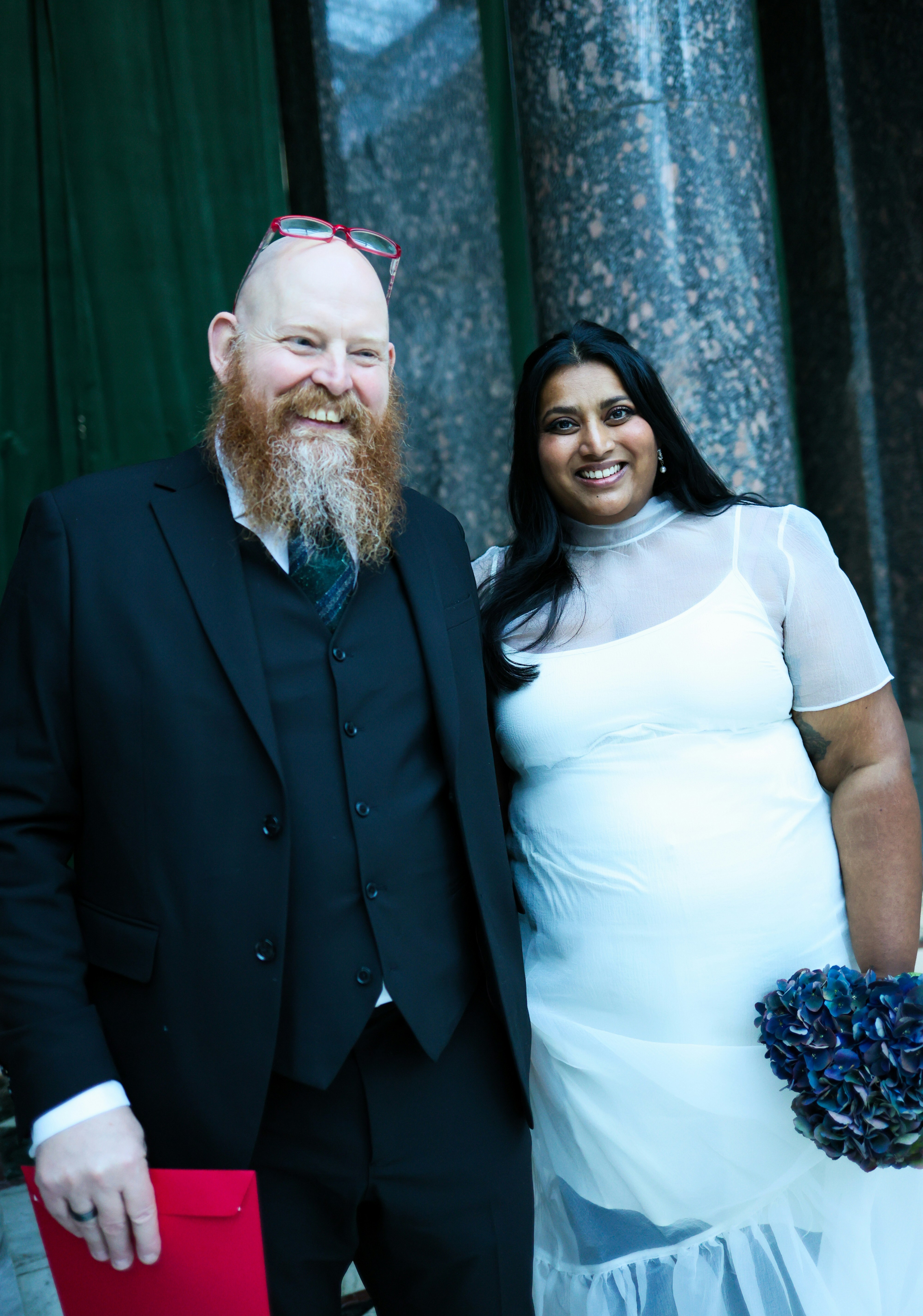 Smiles on the Step: A Dapper Groom and Radiant Bride