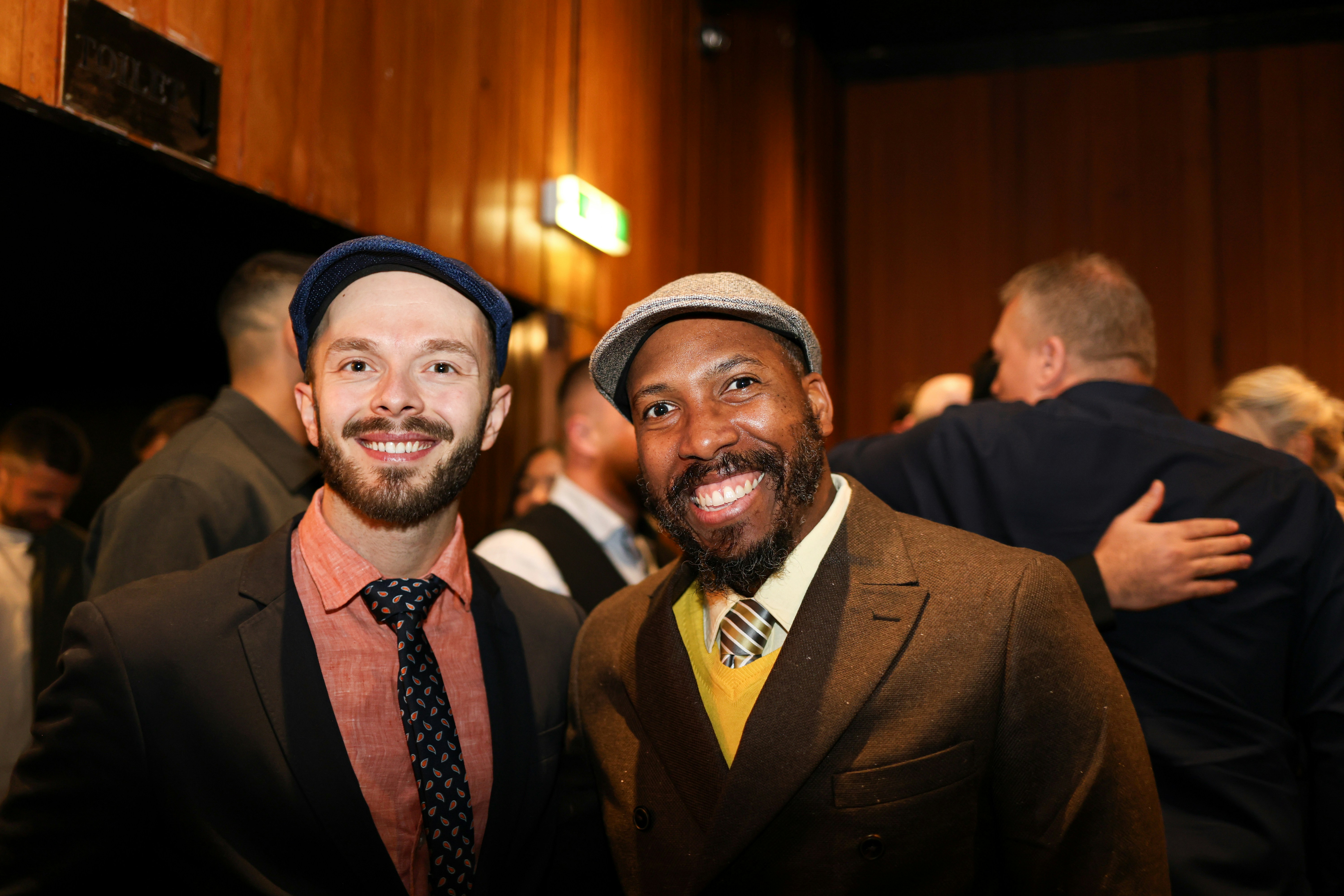 Two smiling men in hats and suits photo – Free Portrait Image on Unsplash