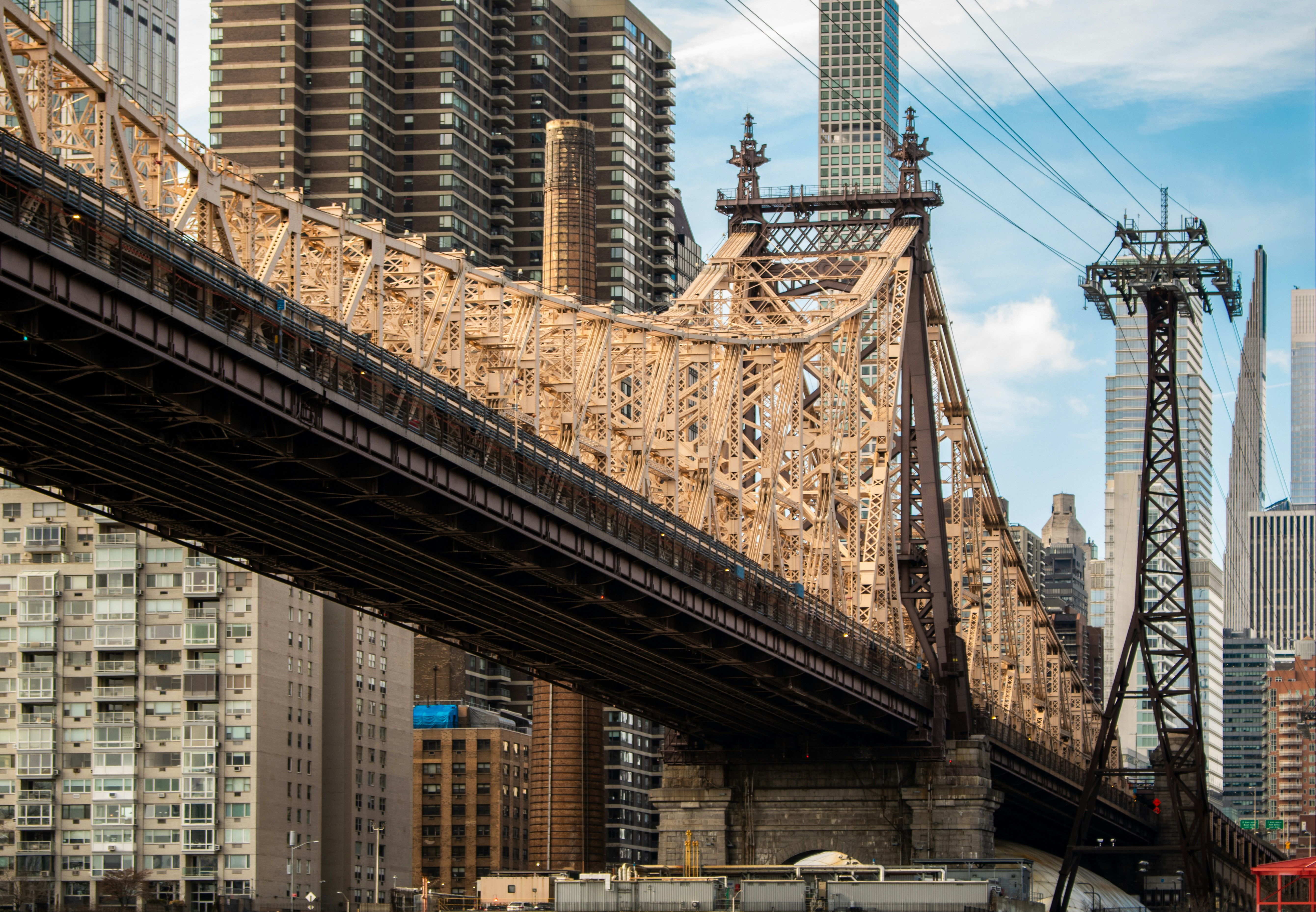 New York’s Steel Spine: A Close-Up of the Bridge’s Lattice and Cityscape