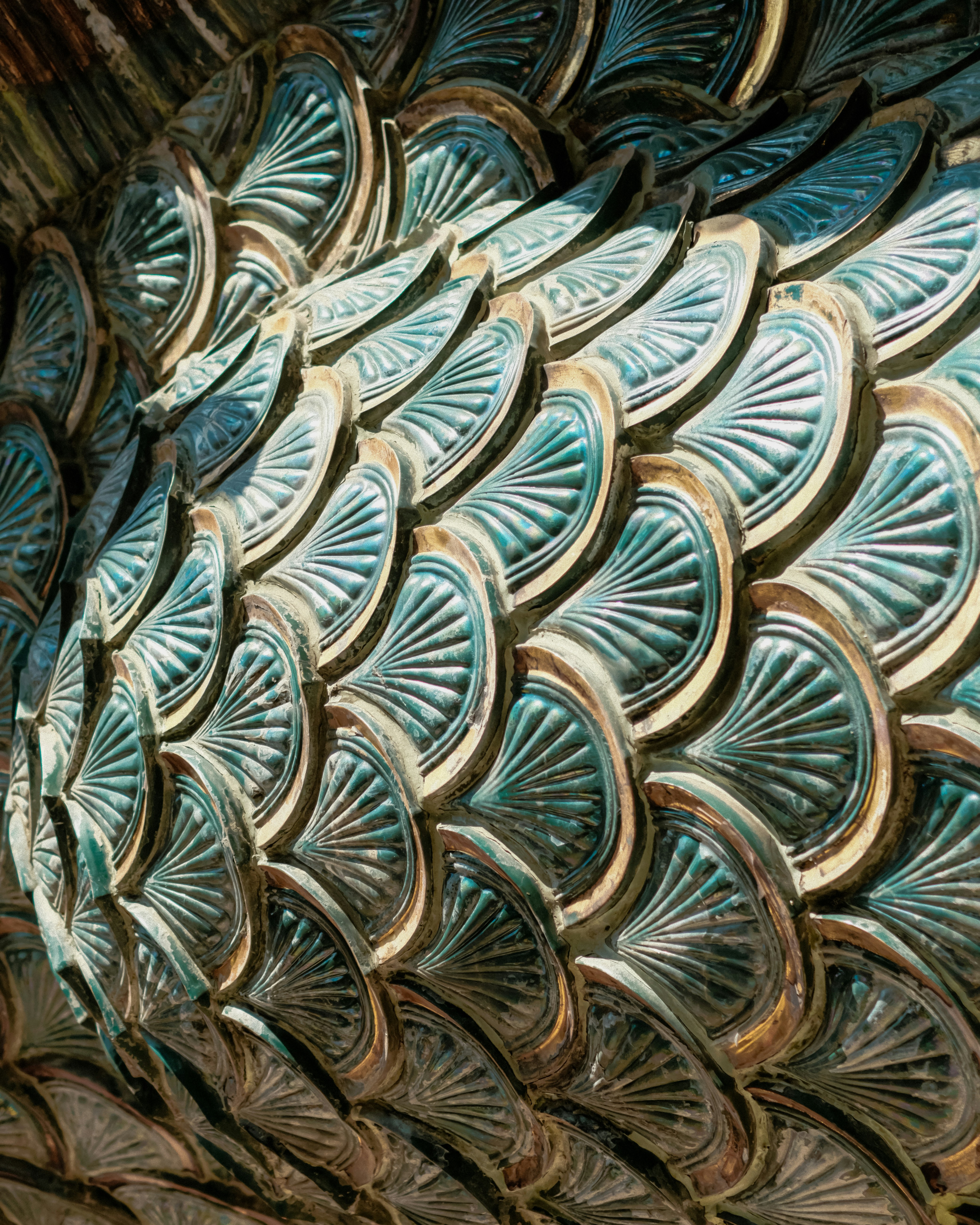 Ceramic Fan Pattern: Repeating Turquoise Ribs in Tilted Light