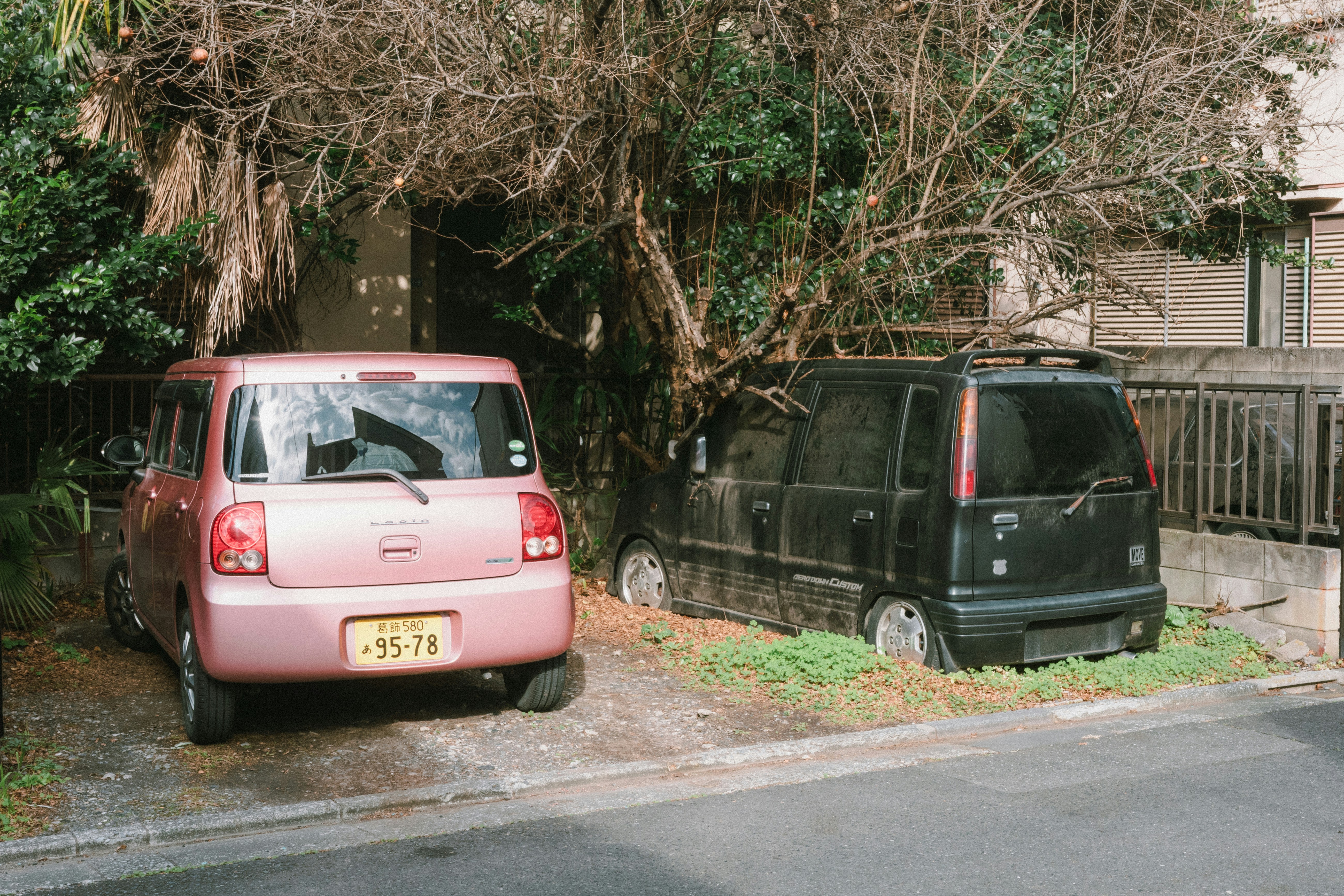 Pastel Pink Commuter in a Quiet Parking Nook