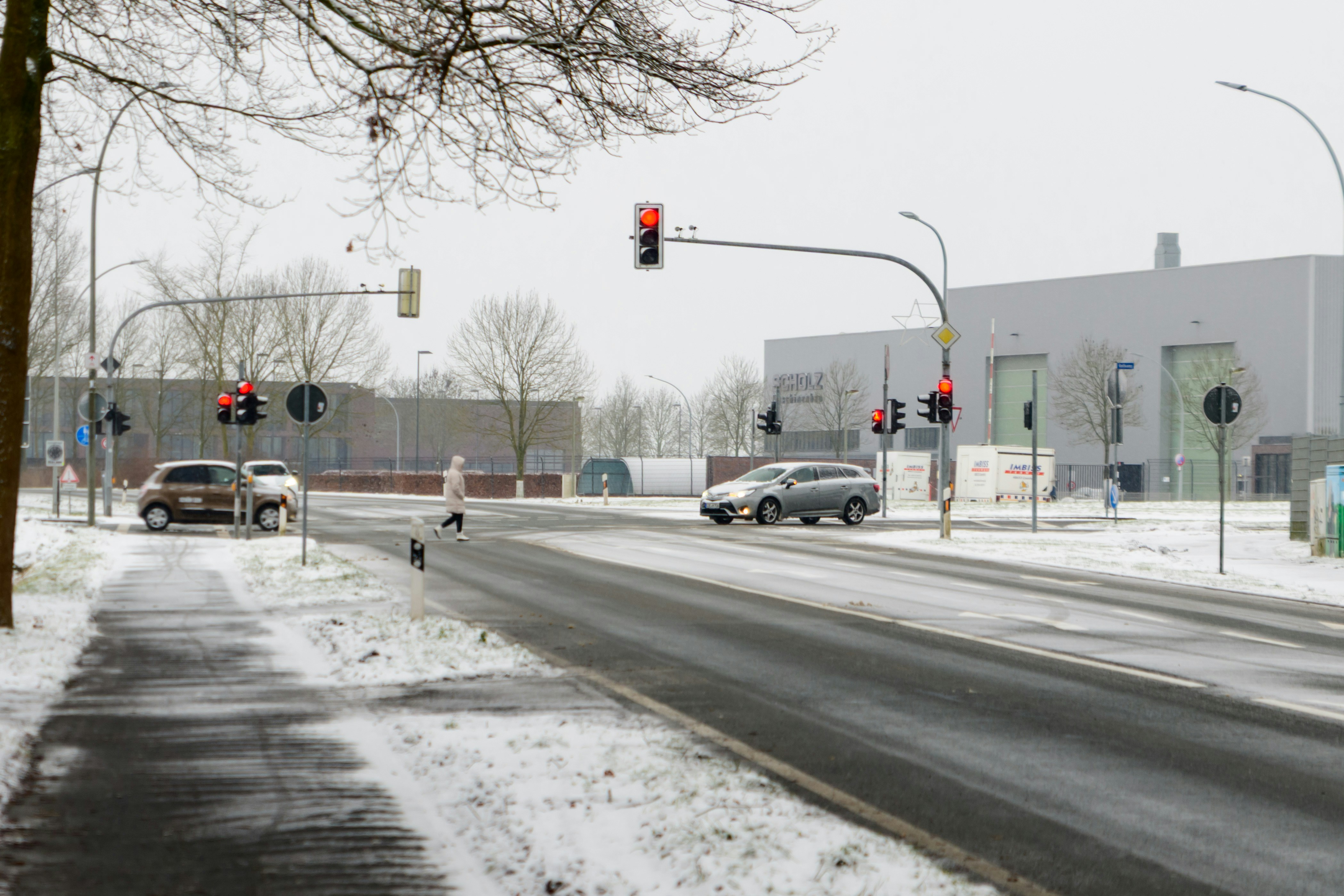 Winter Crossing: A Quiet City Intersection Under Snow
