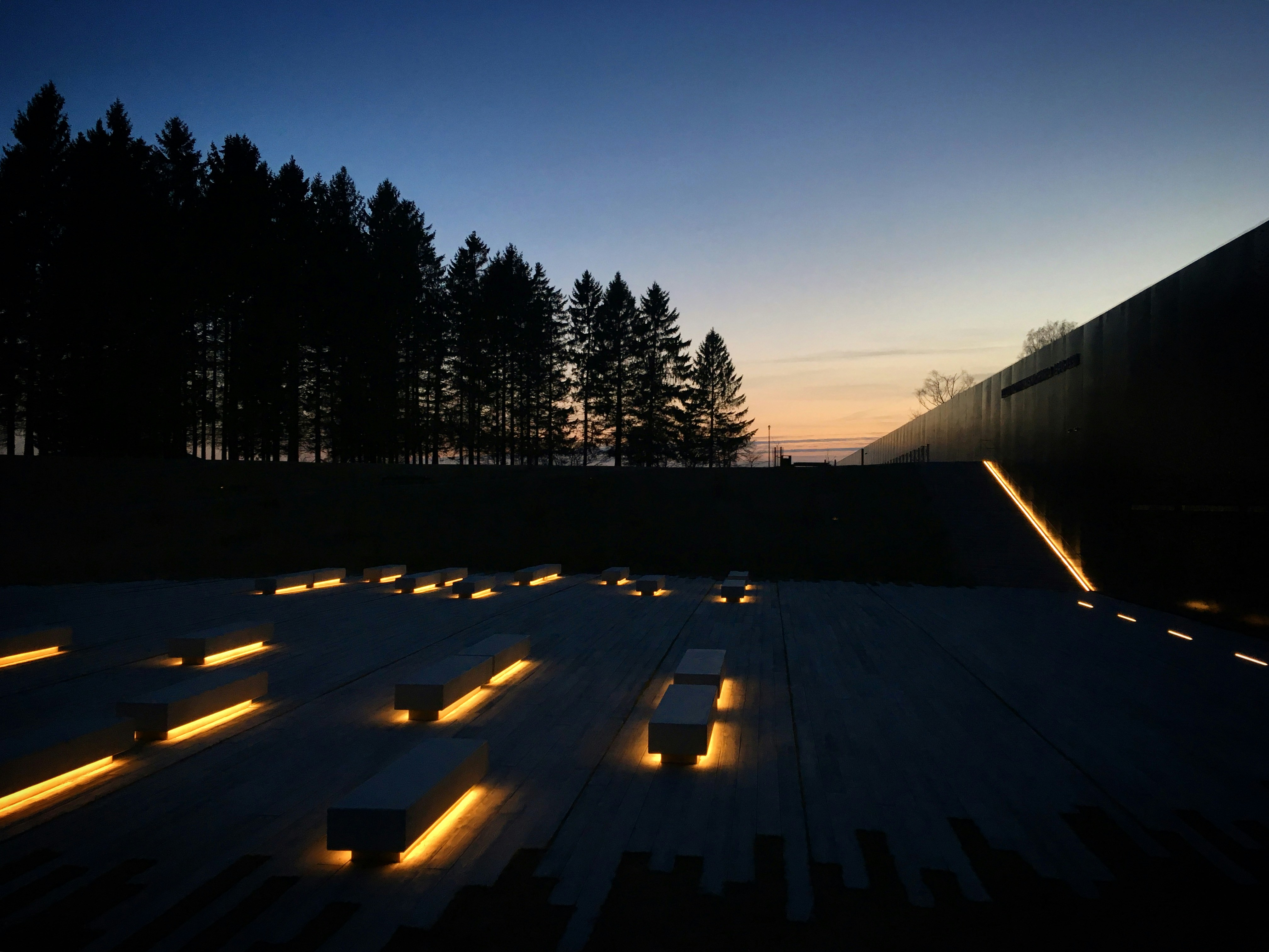 Evening Echoes: Illuminated Benches Melt into Dusk