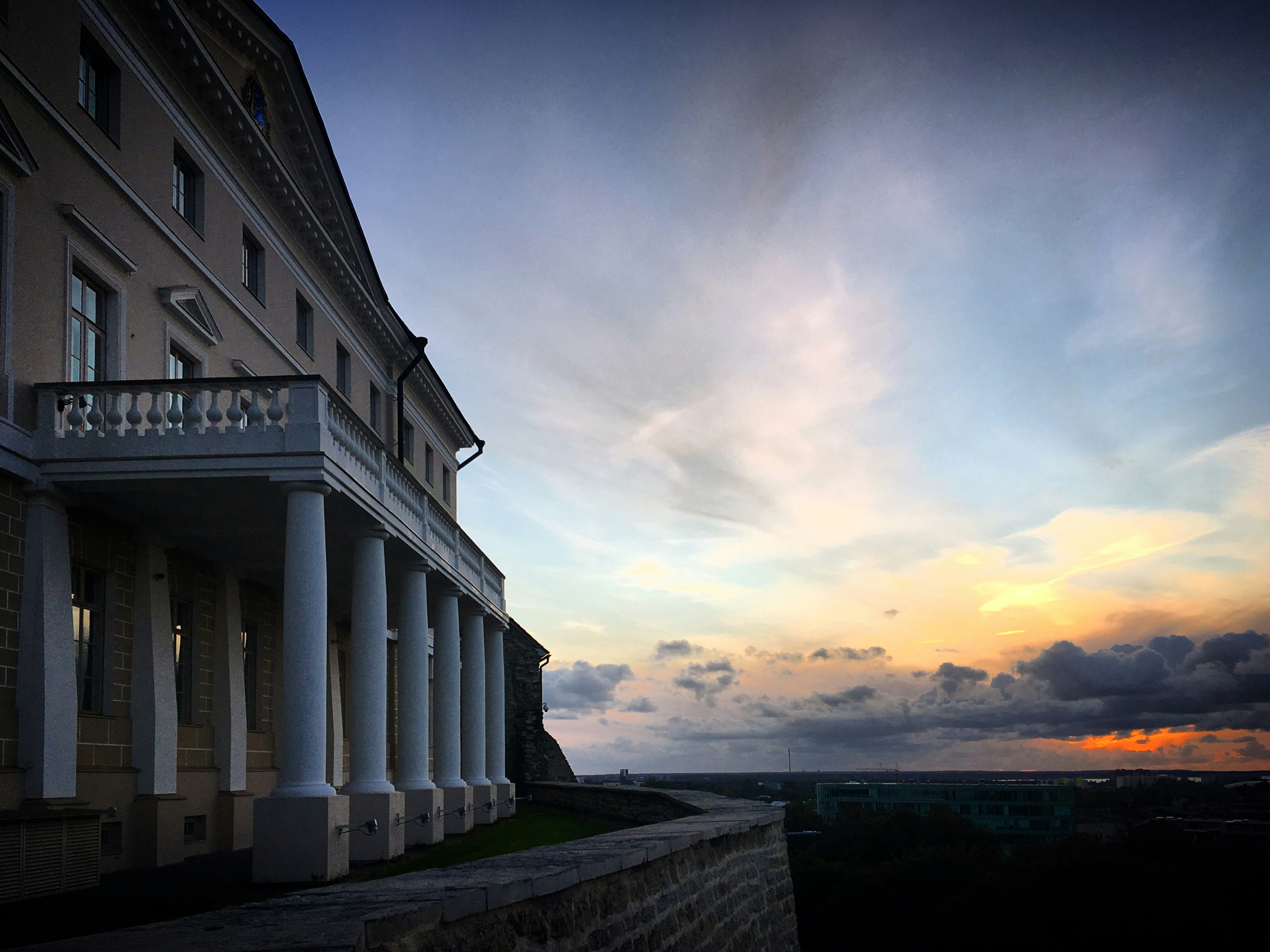 Maritime Terrace at Sunset: Columns Reaching Toward the Horizon