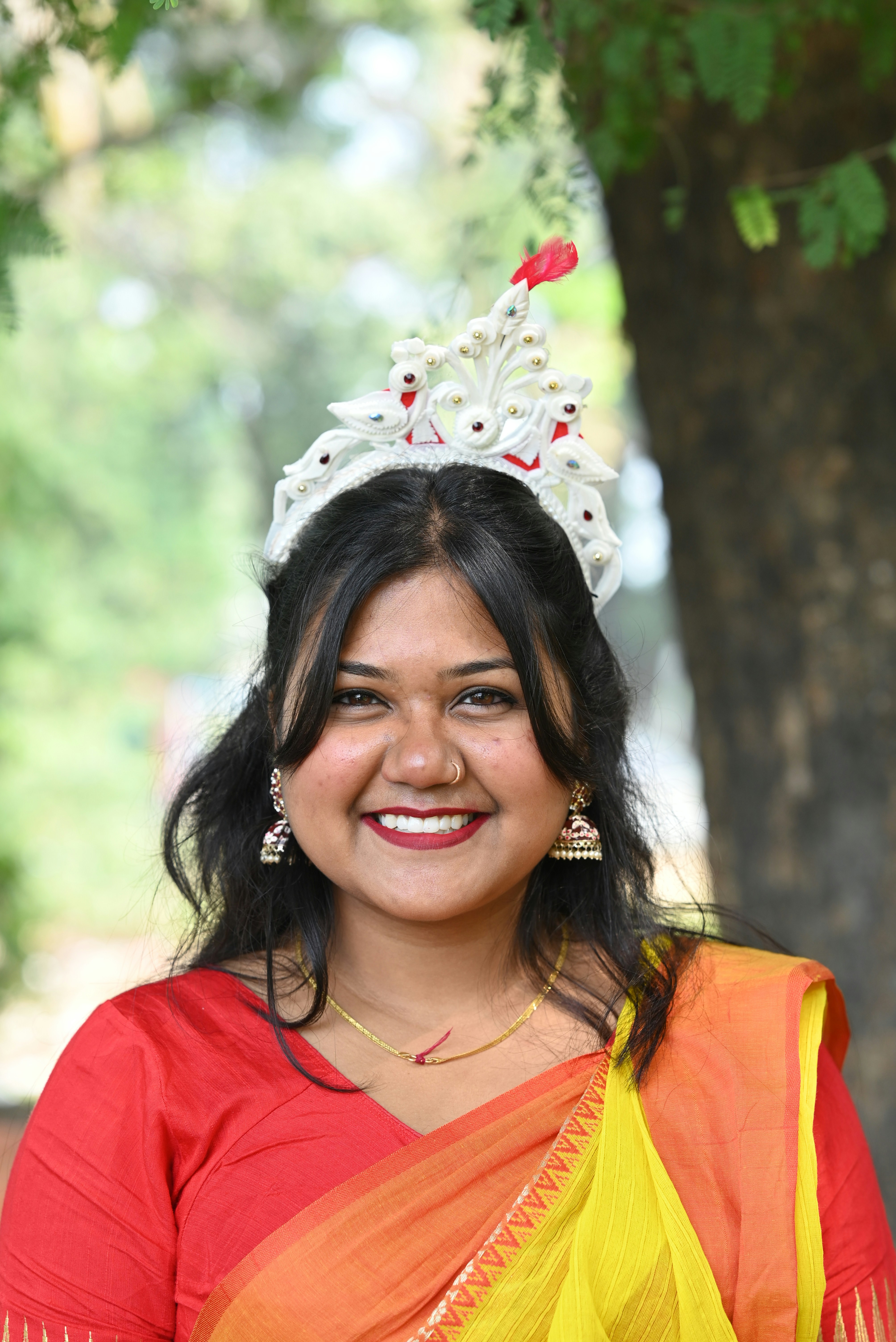 Bright Sari, Bright Smile: A Portrait in Colorful Tradition