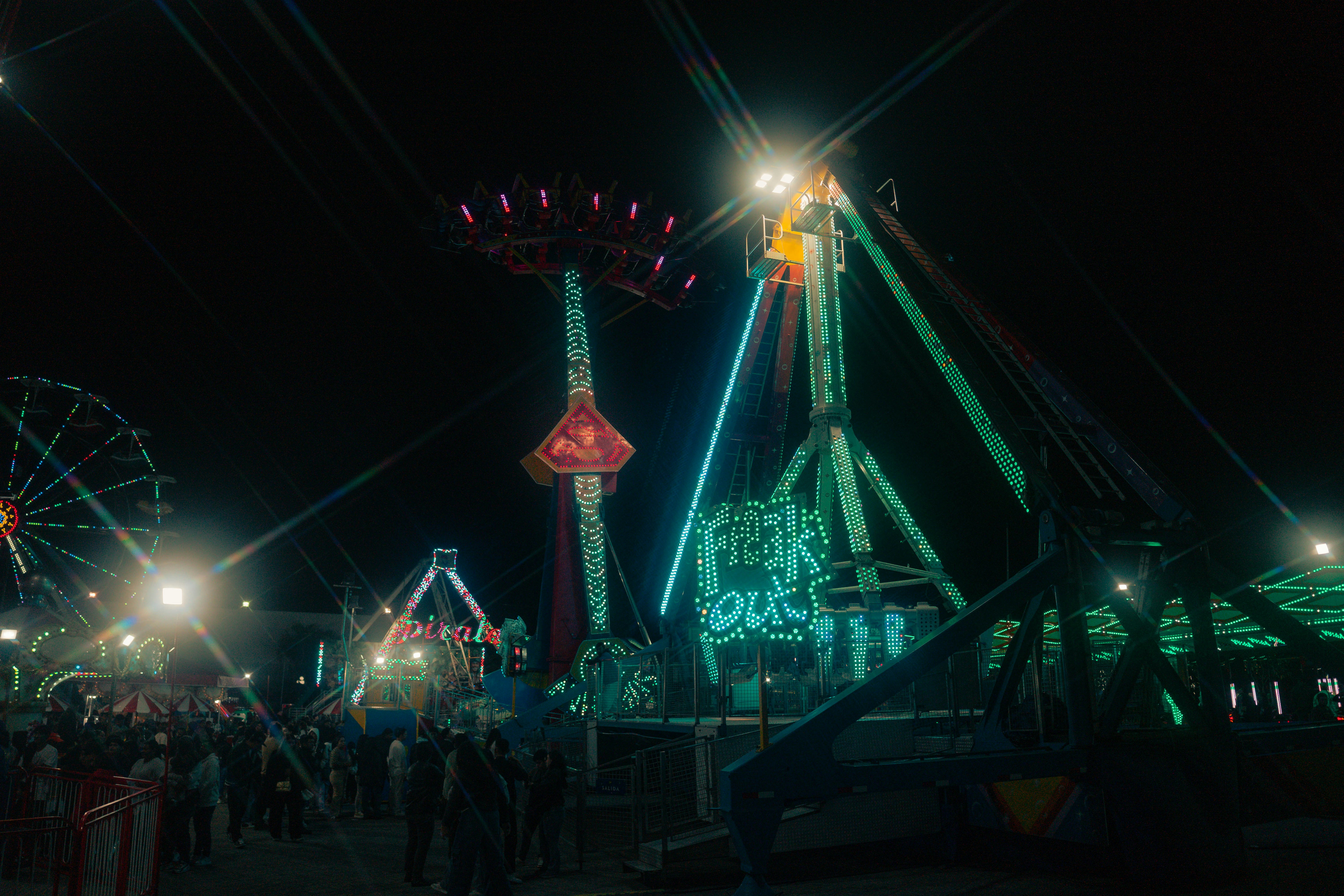 Neon Arches at Night: A Whimsical Carnival Pulse