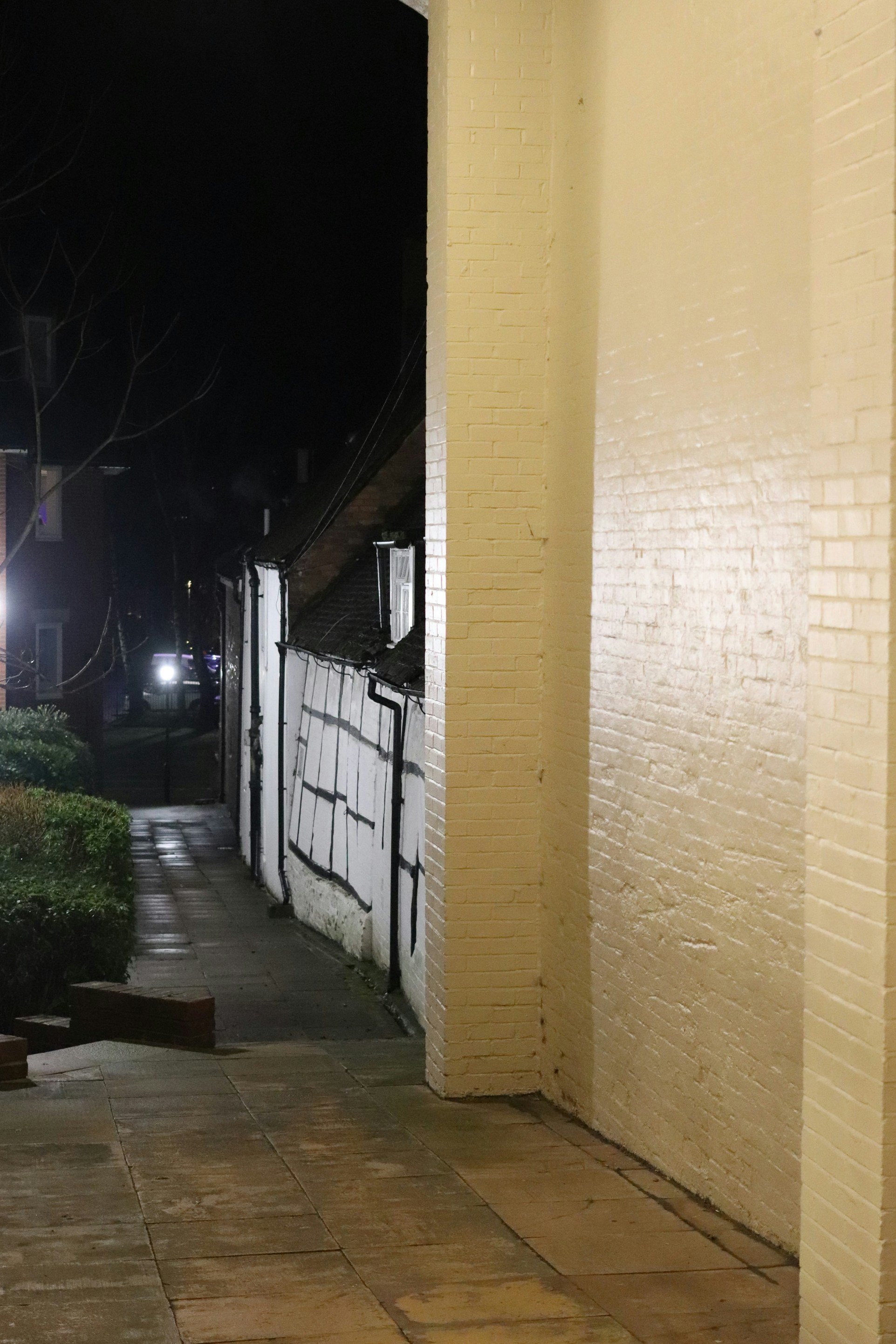 Night Walk along a Quiet Brick Alley