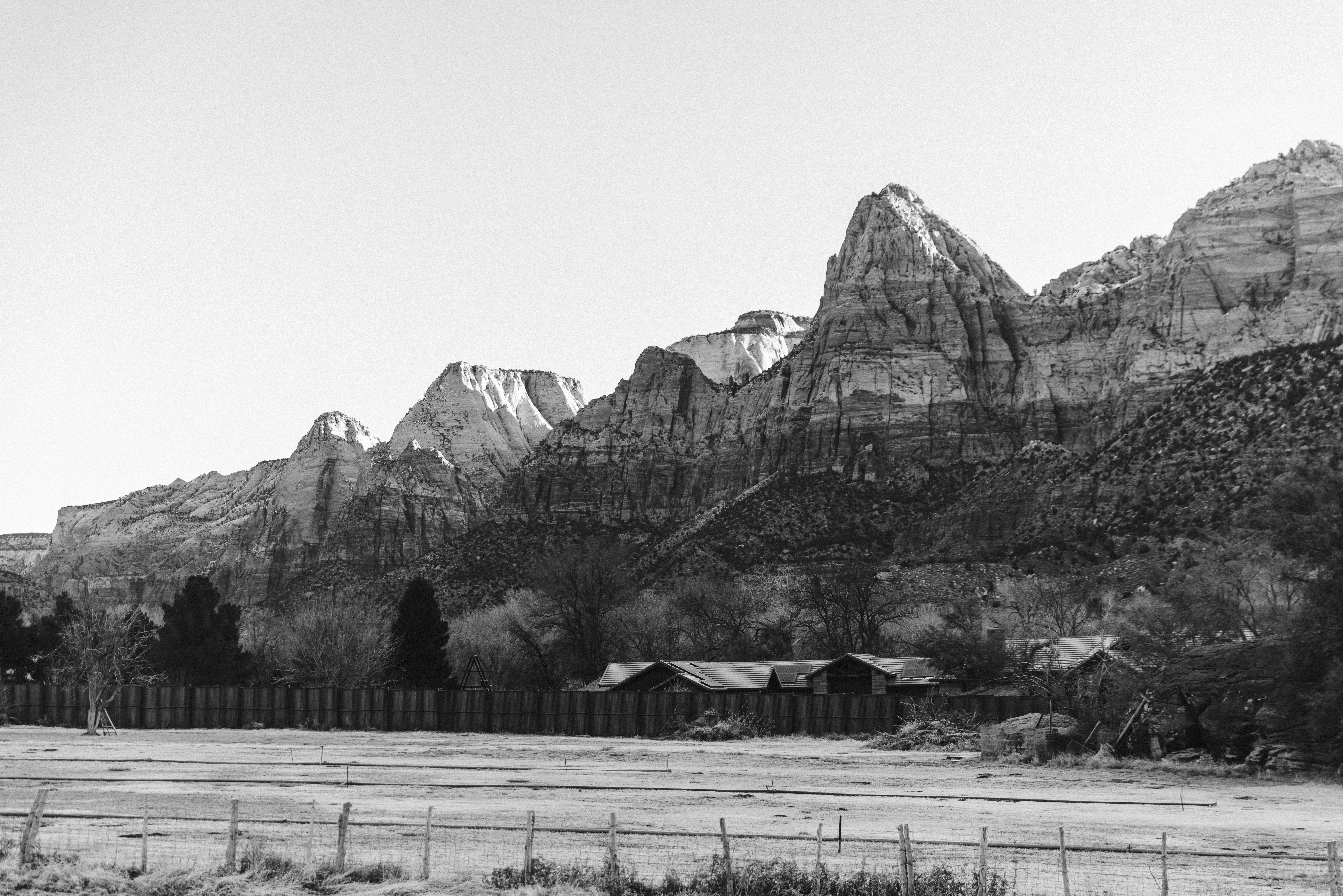 Rugged Range Overlook: A Quiet Ranch Beneath Tarnished Peaks