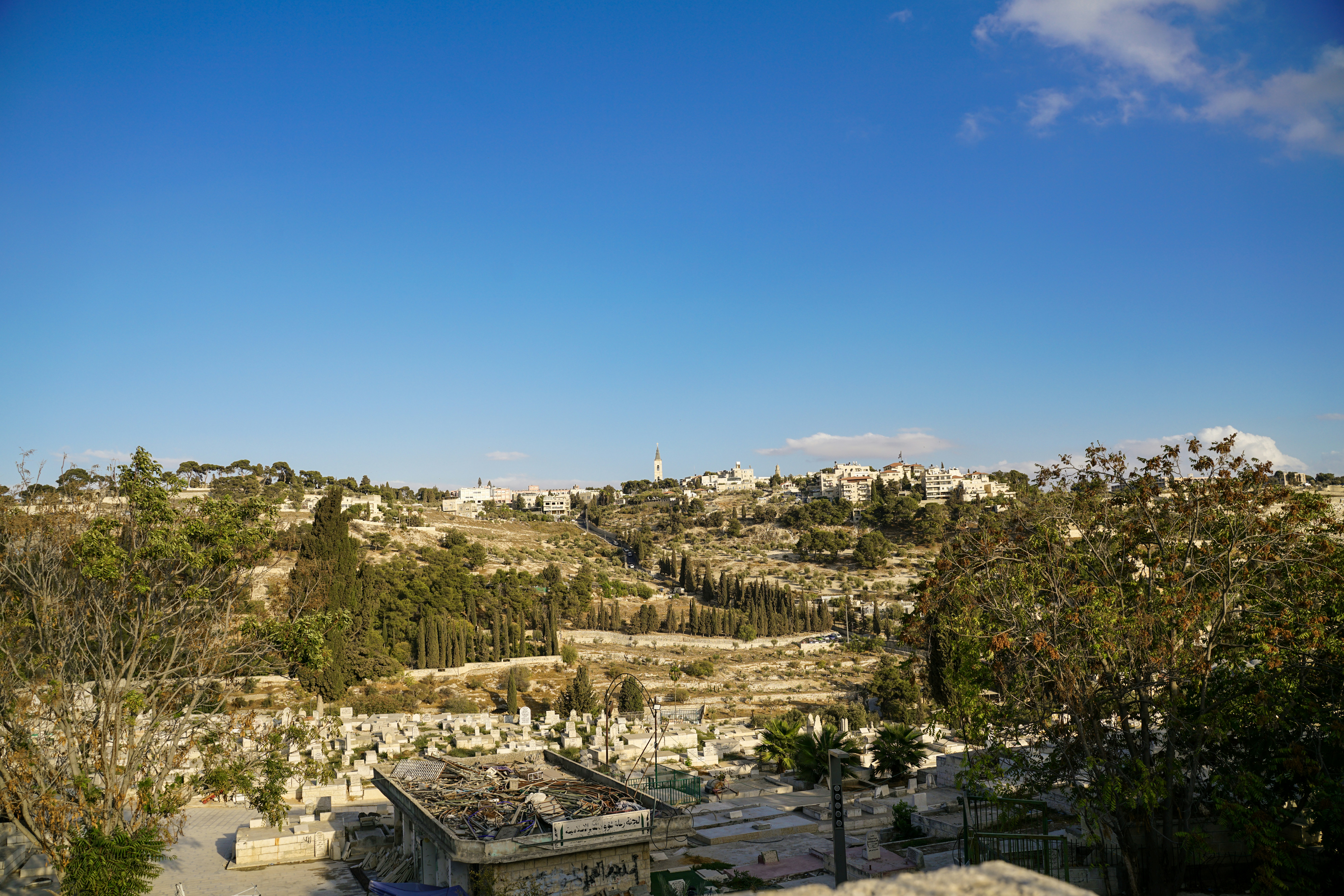 Horizon of Antiquity: Terraced Graves Below a Clear Blue Sky