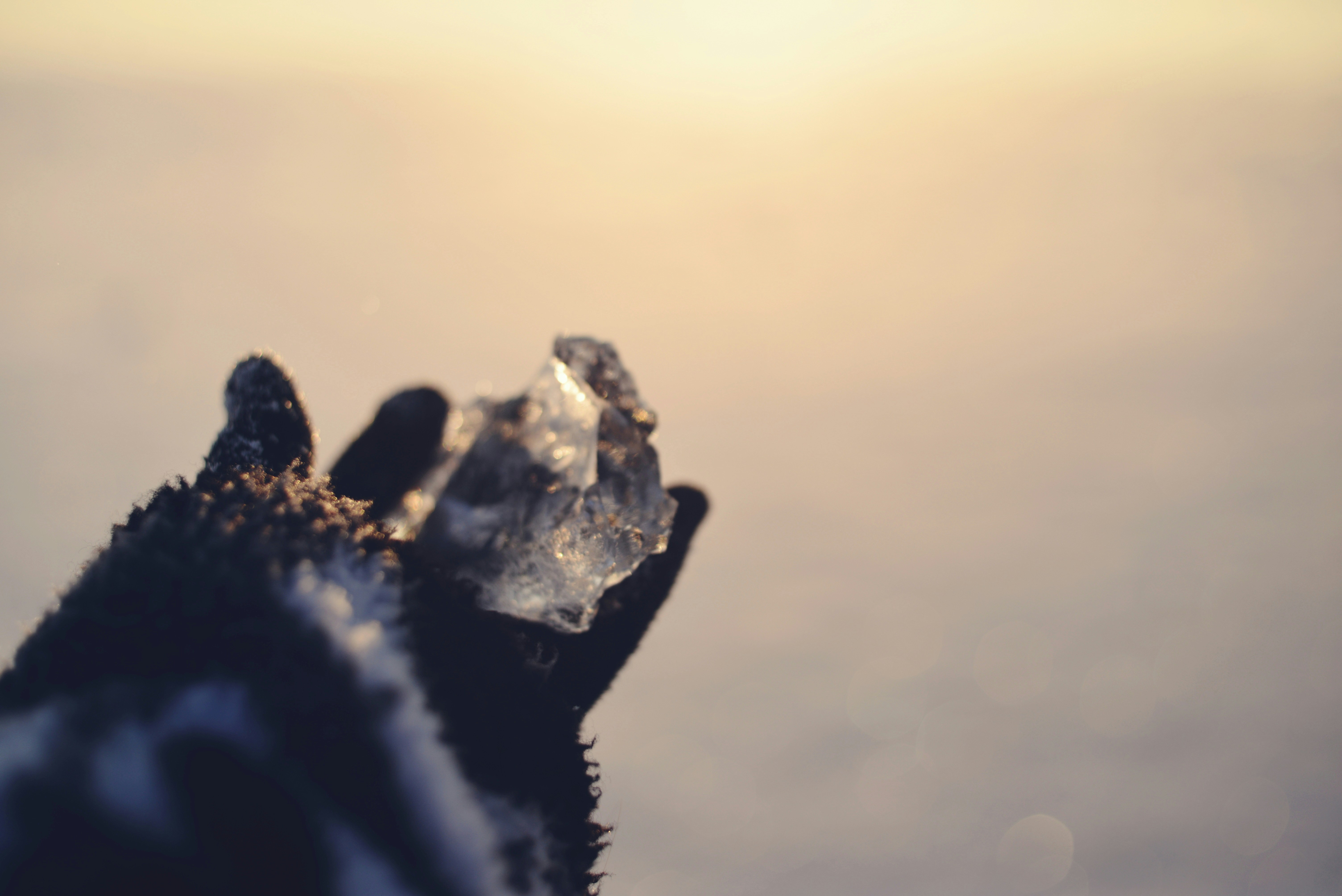 Fragile Prism on the Shore: Ice Crystals Catch the Low Sun