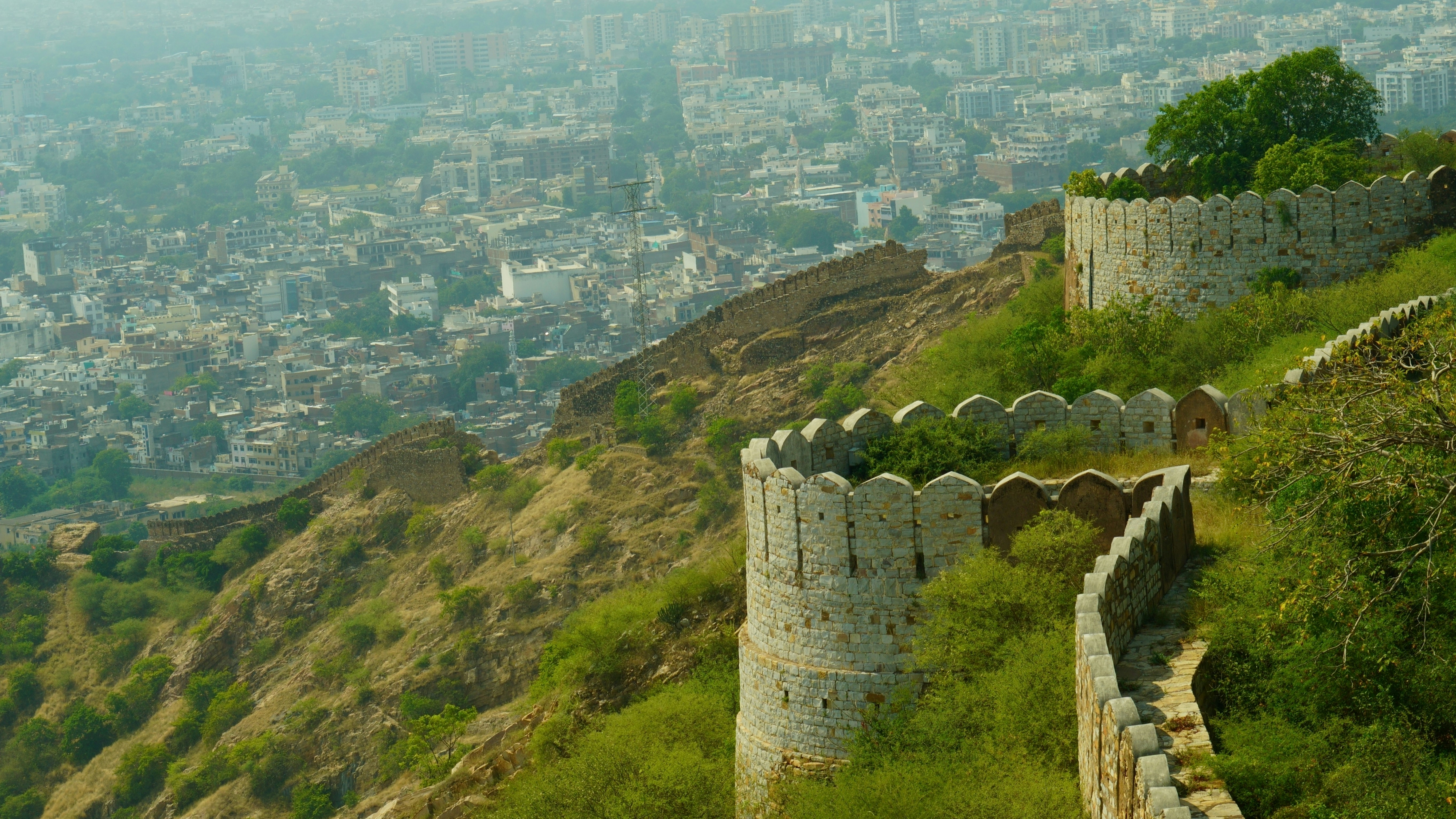 Stone Stairways and City Veil: A Hilltop Fortress Overlooking Urban Sprawl