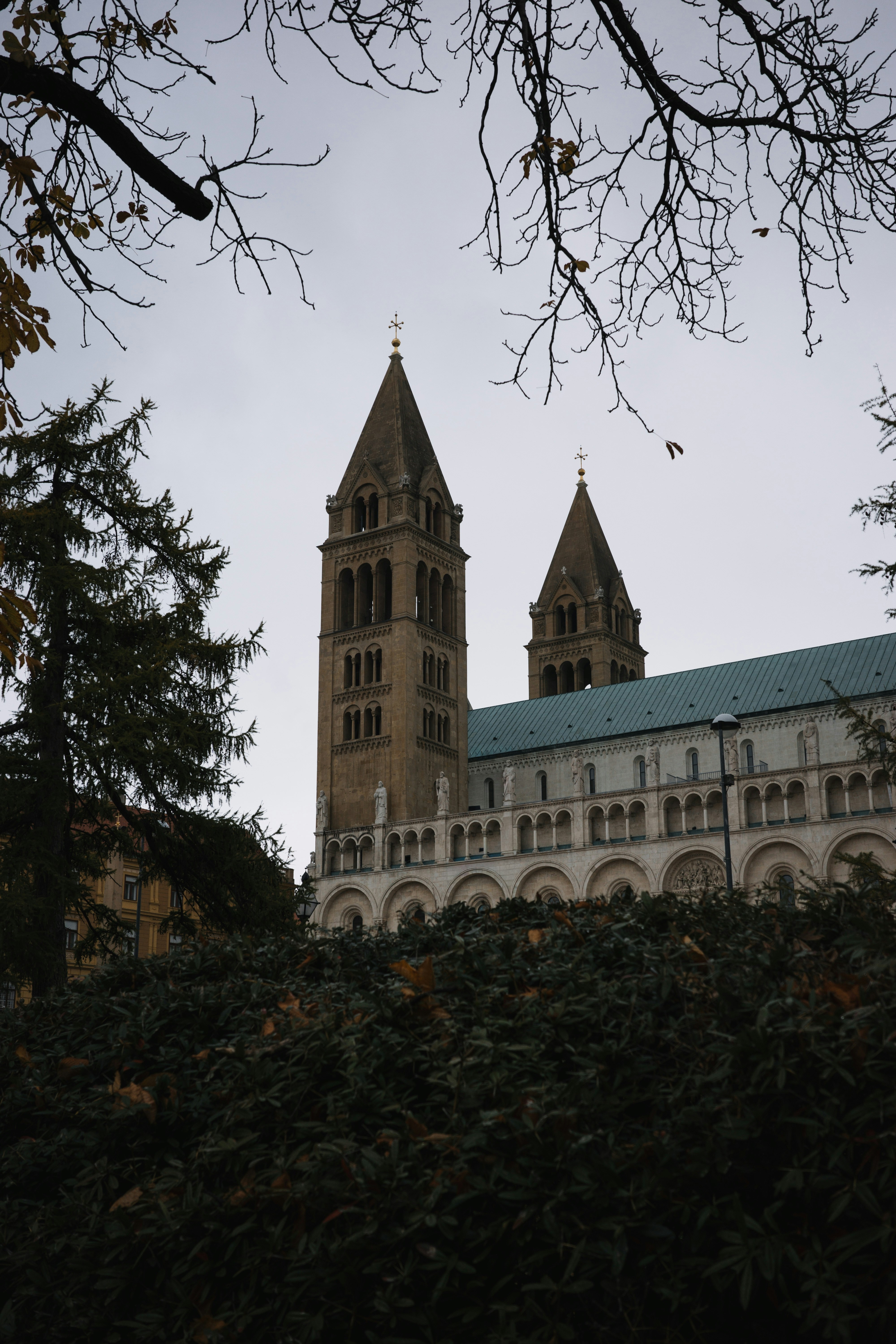 A large stone cathedral with two prominent towers. photo – Free ...