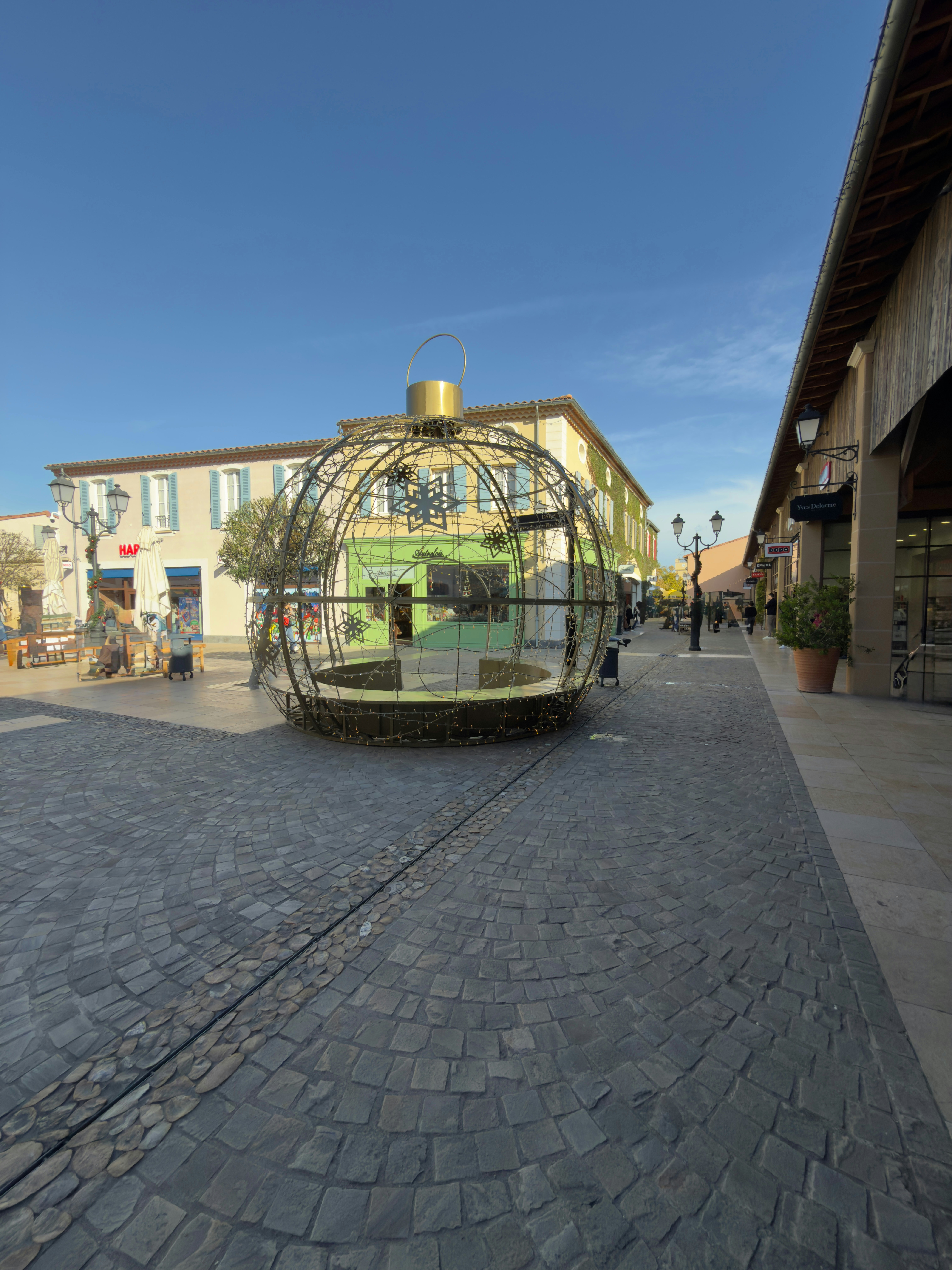 Spherical Atrium on a Sunlit Piazza