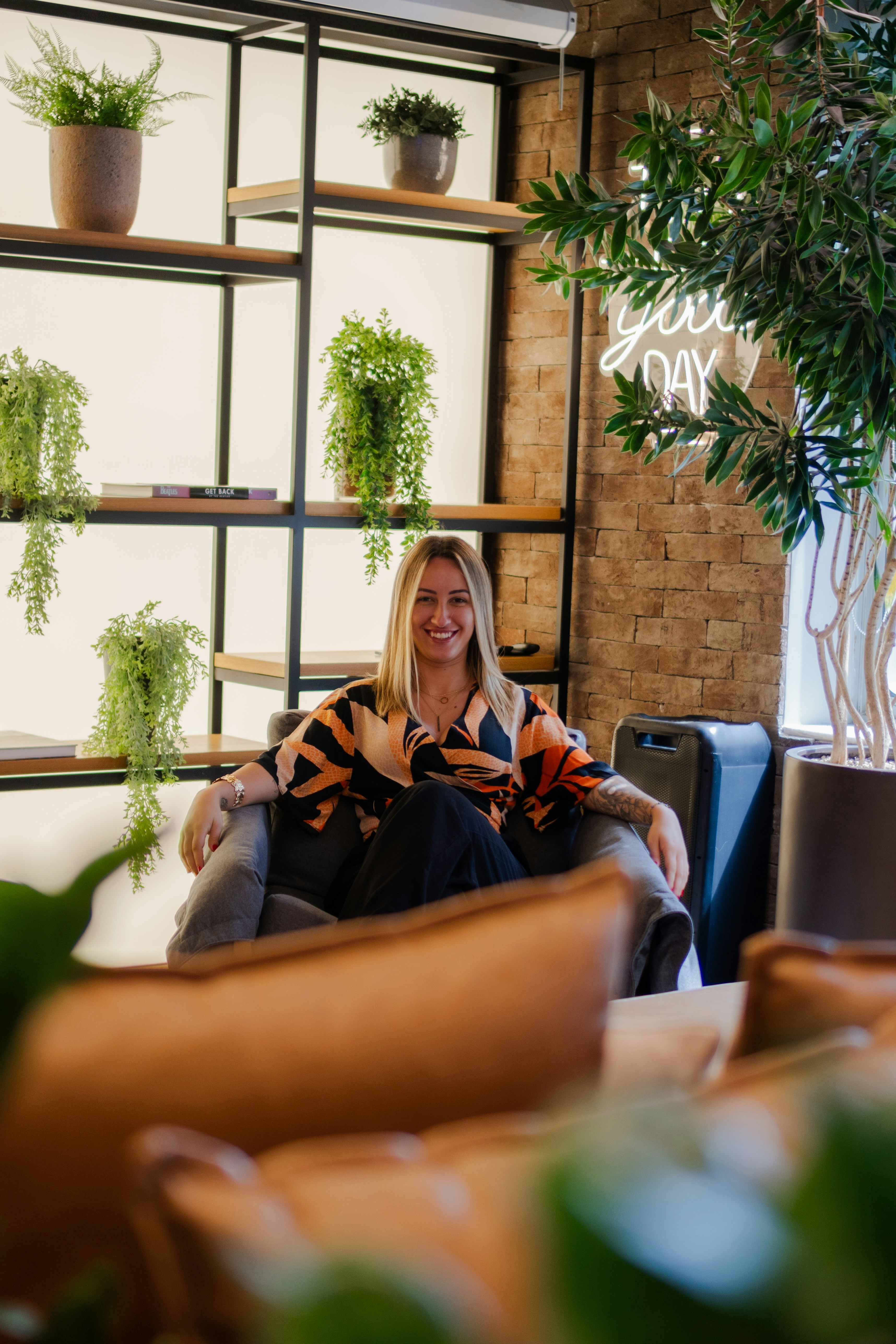 Relaxed Confidence in a Sunny Creative Lounge