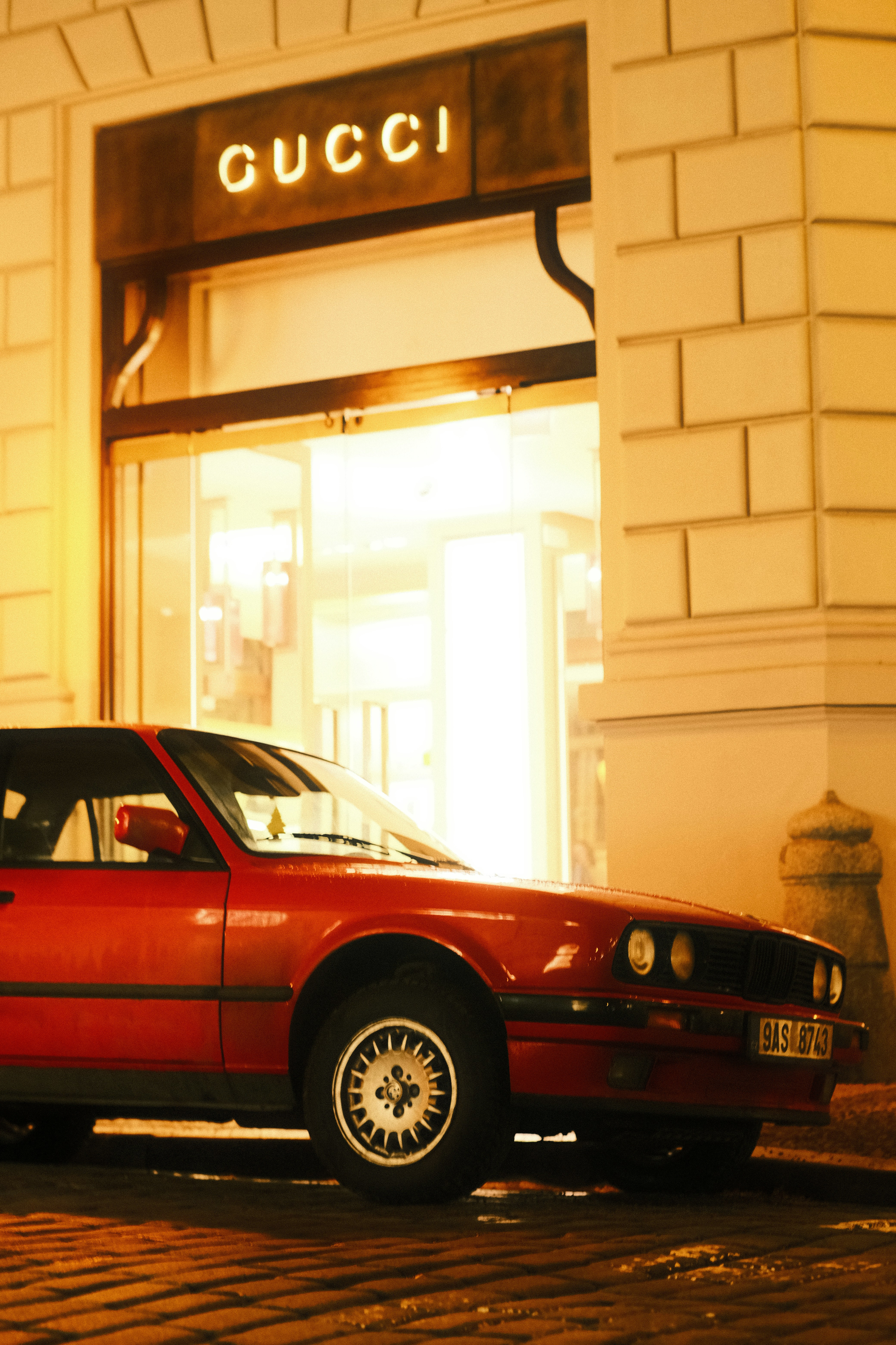 Red Coupe by the Gucci Gate