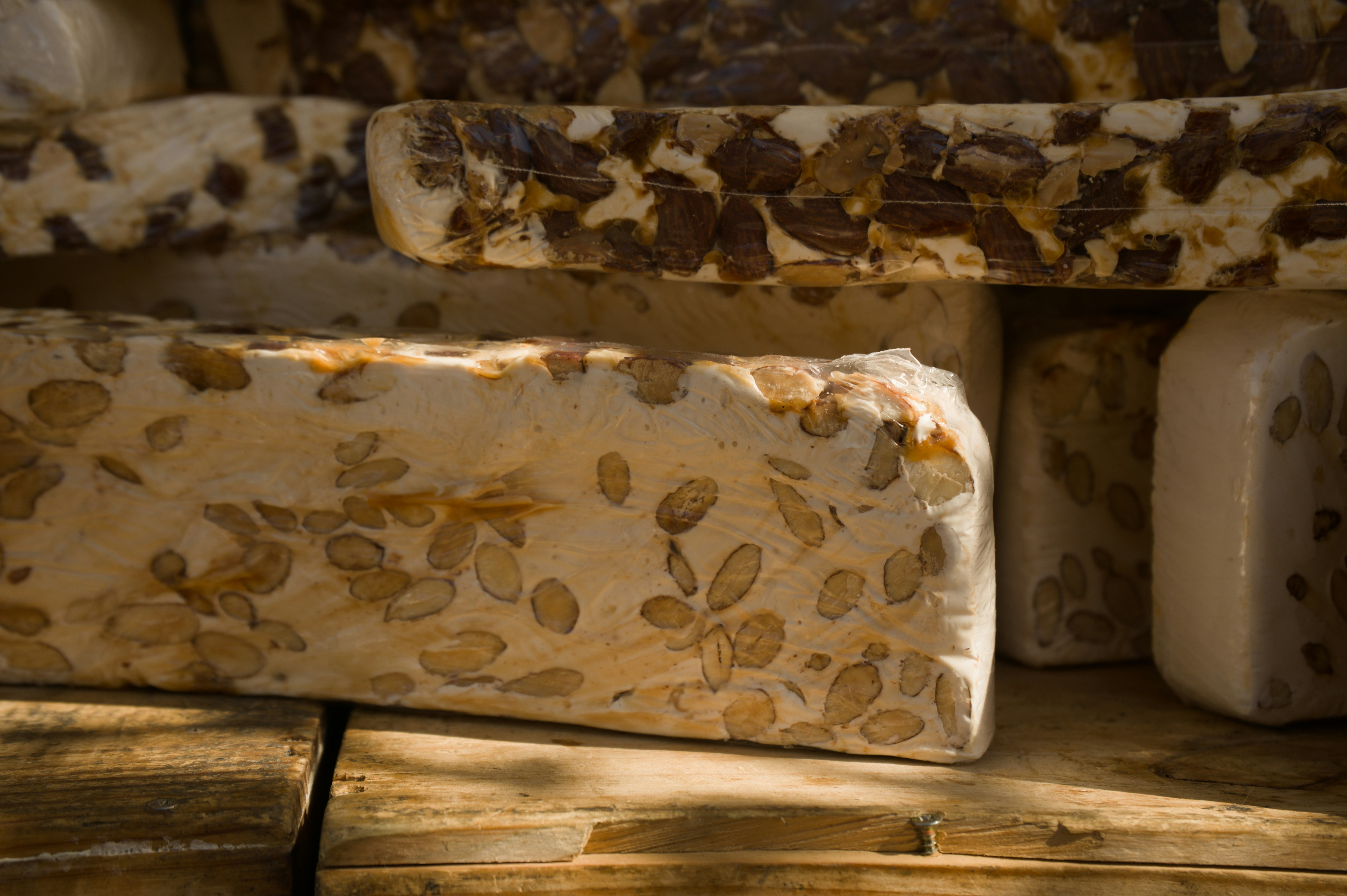 Sealed in Seeds: Baroque Soap Layers Resting on Wooden Slats