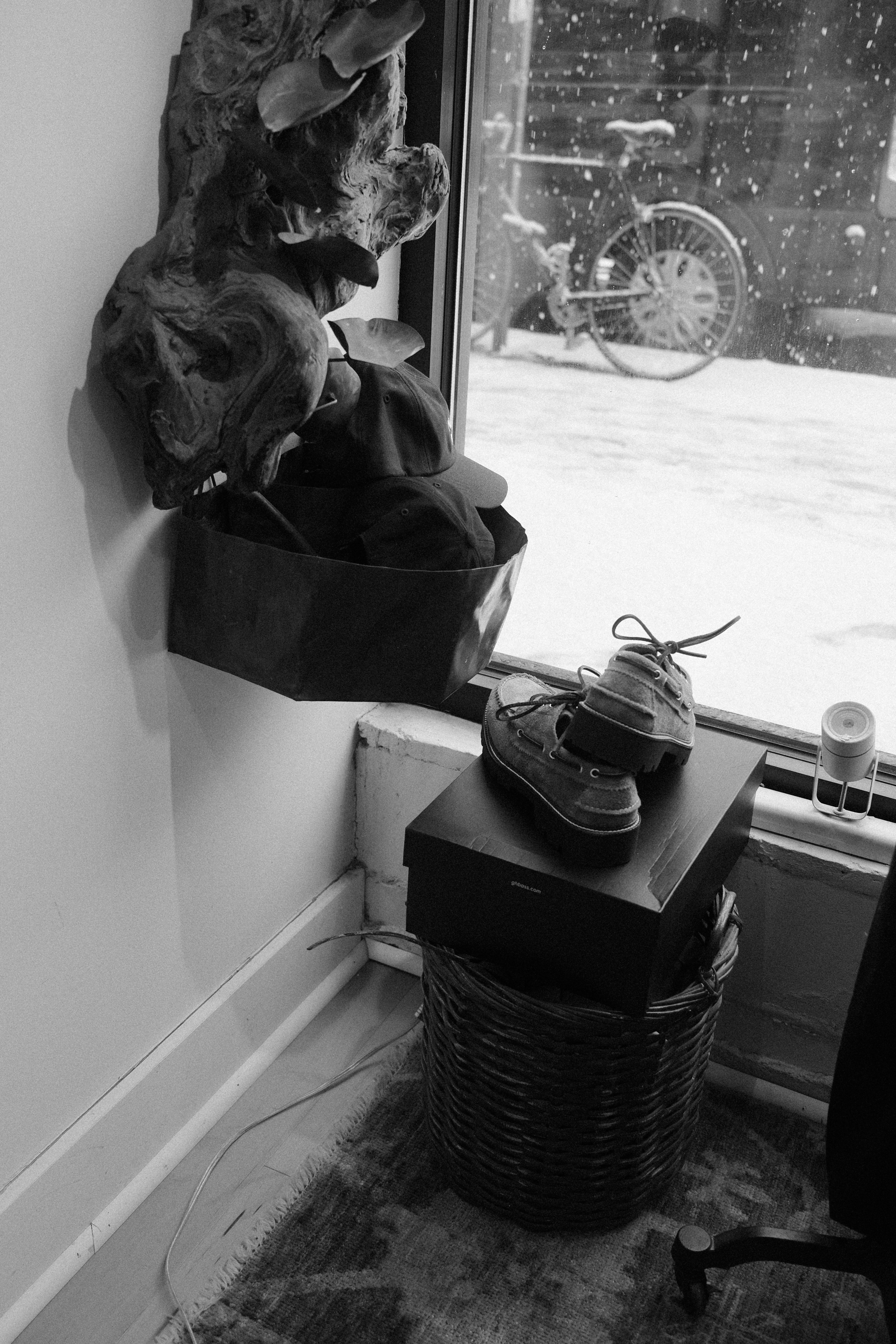 Miniature Sneakers by the Window: A Quiet Corner in monochrome