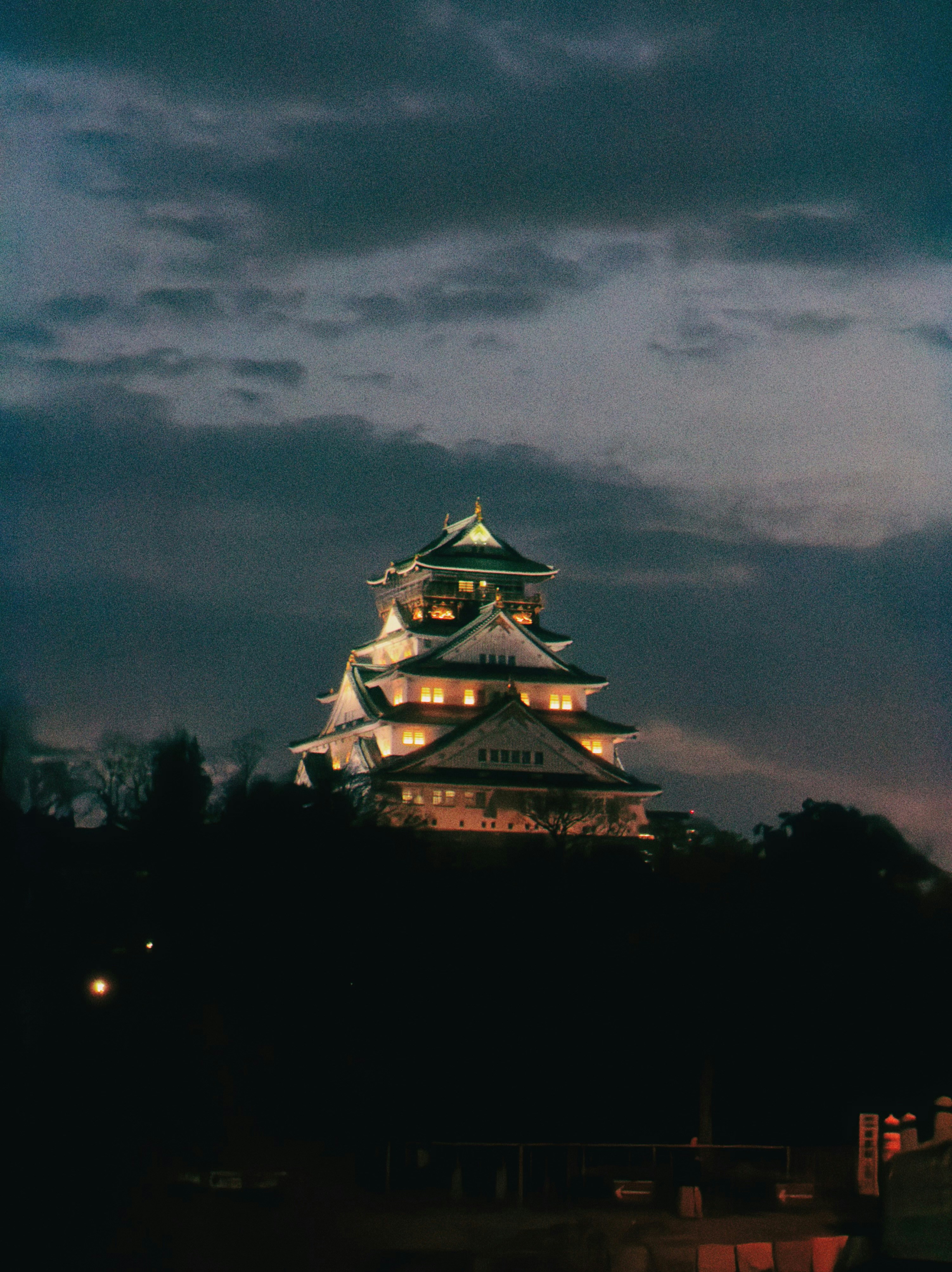 Moonlit Castle: A Quiet Night Above the Rooftops
