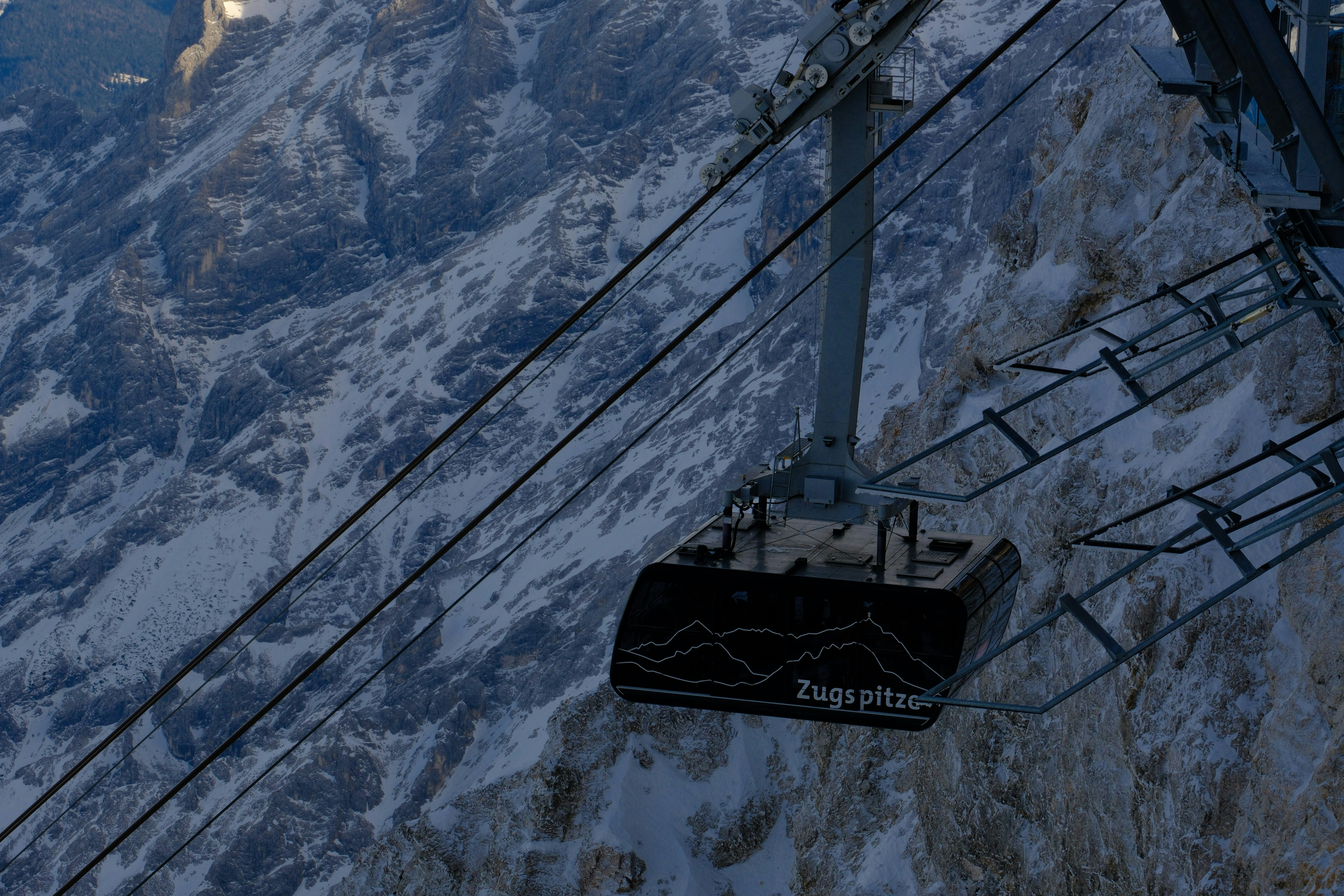 Ridge Line Lift: A Suspended Chair Car Glides Across Alpine Slopes