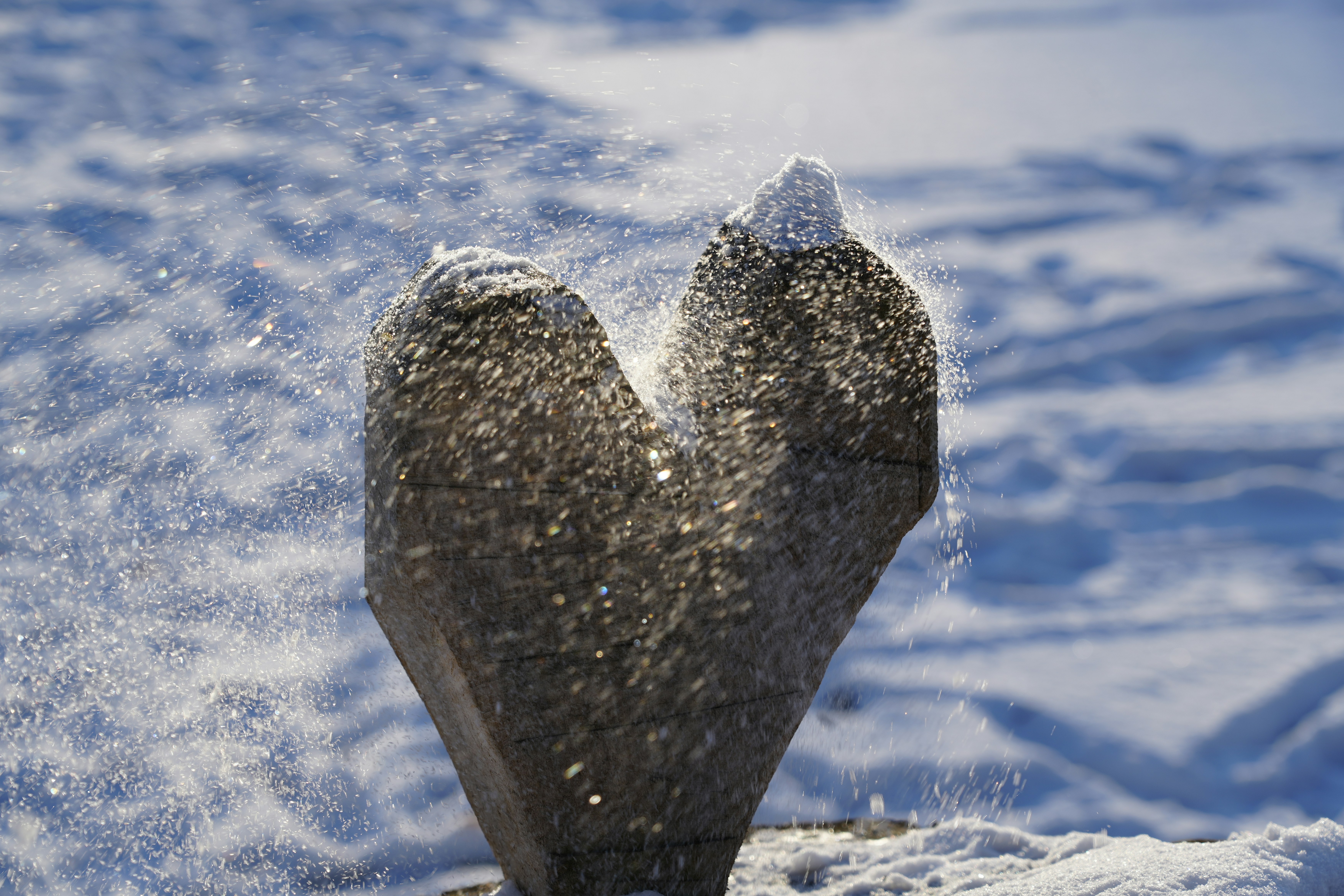 Snow-sprayed Heart: A Floating Stone in a Frigid Surge