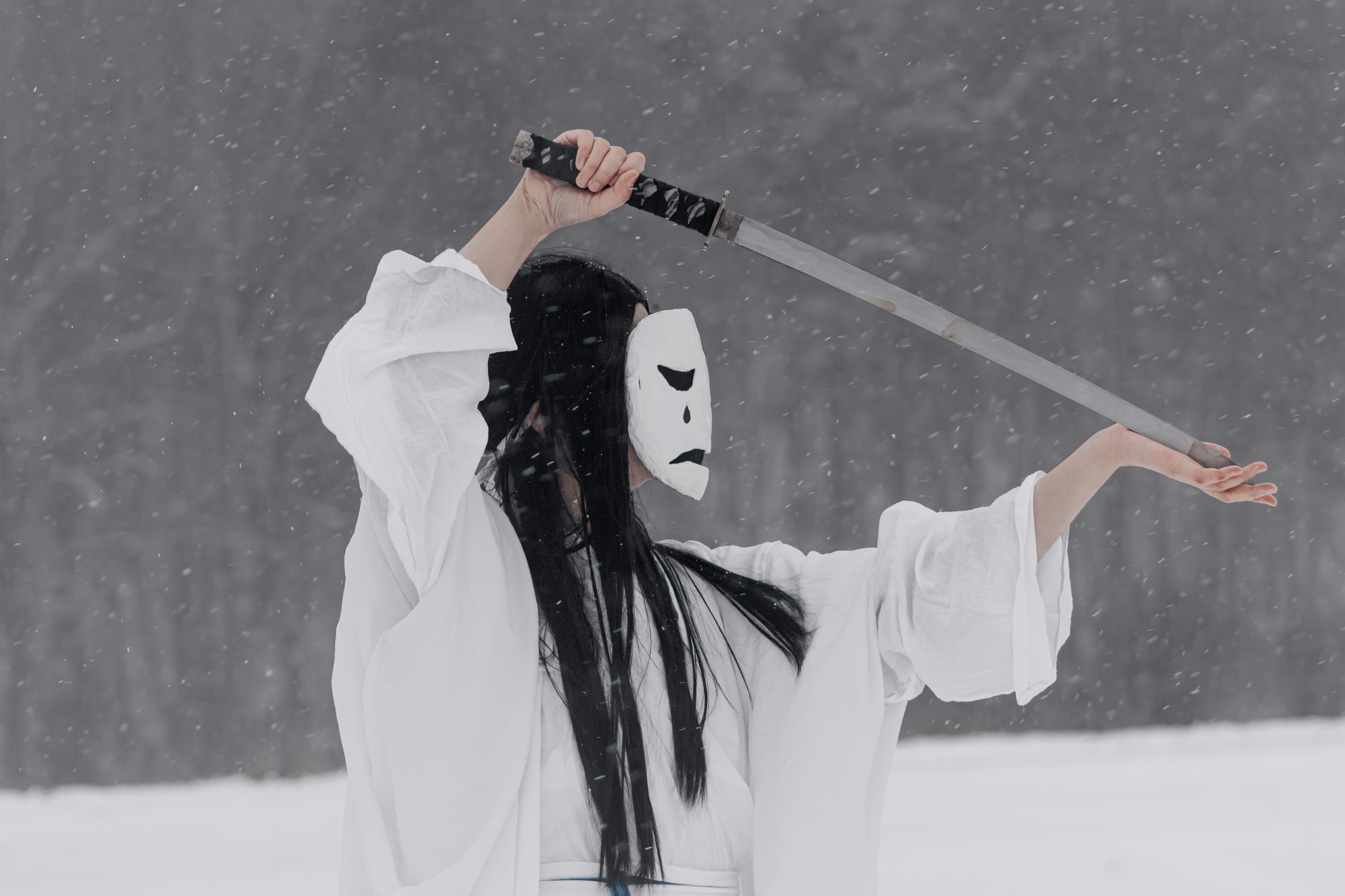 Masked Samurai in Snow: A Silent Gesture with a Sharp Blade