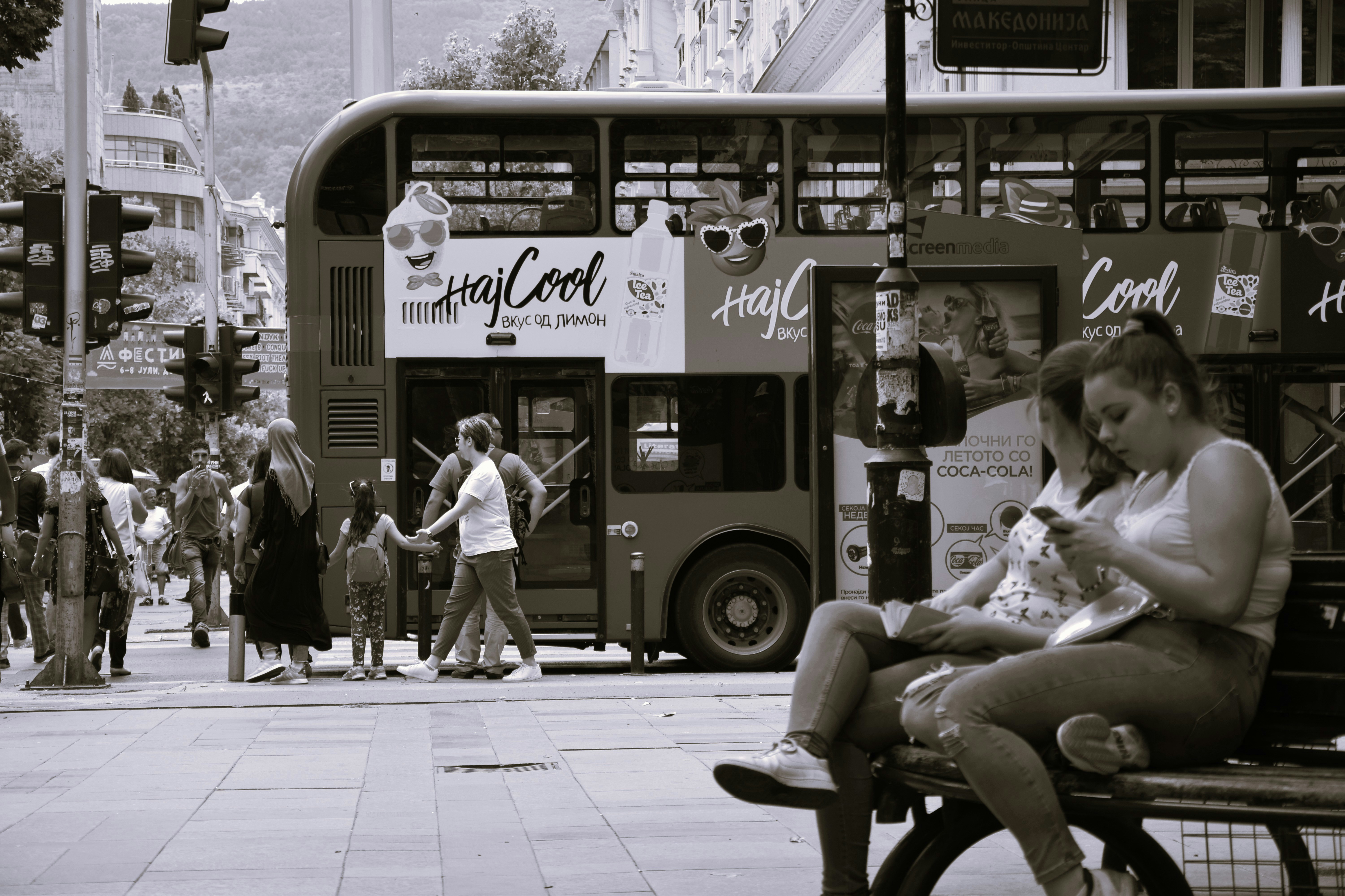 City Bench: Quiet Moment as the Bus Rumbles by